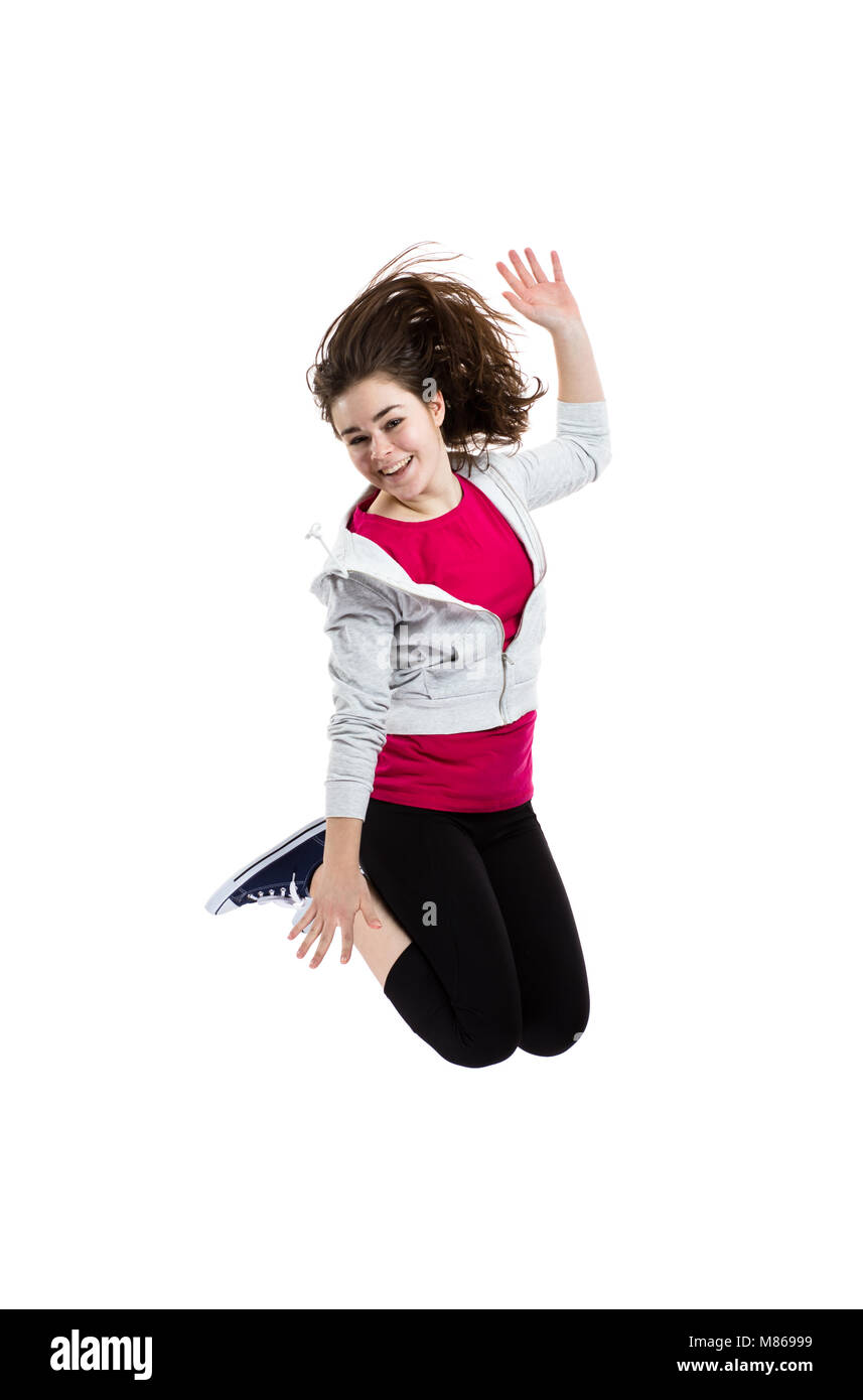 Young woman jumping on white background Stock Photo - Alamy