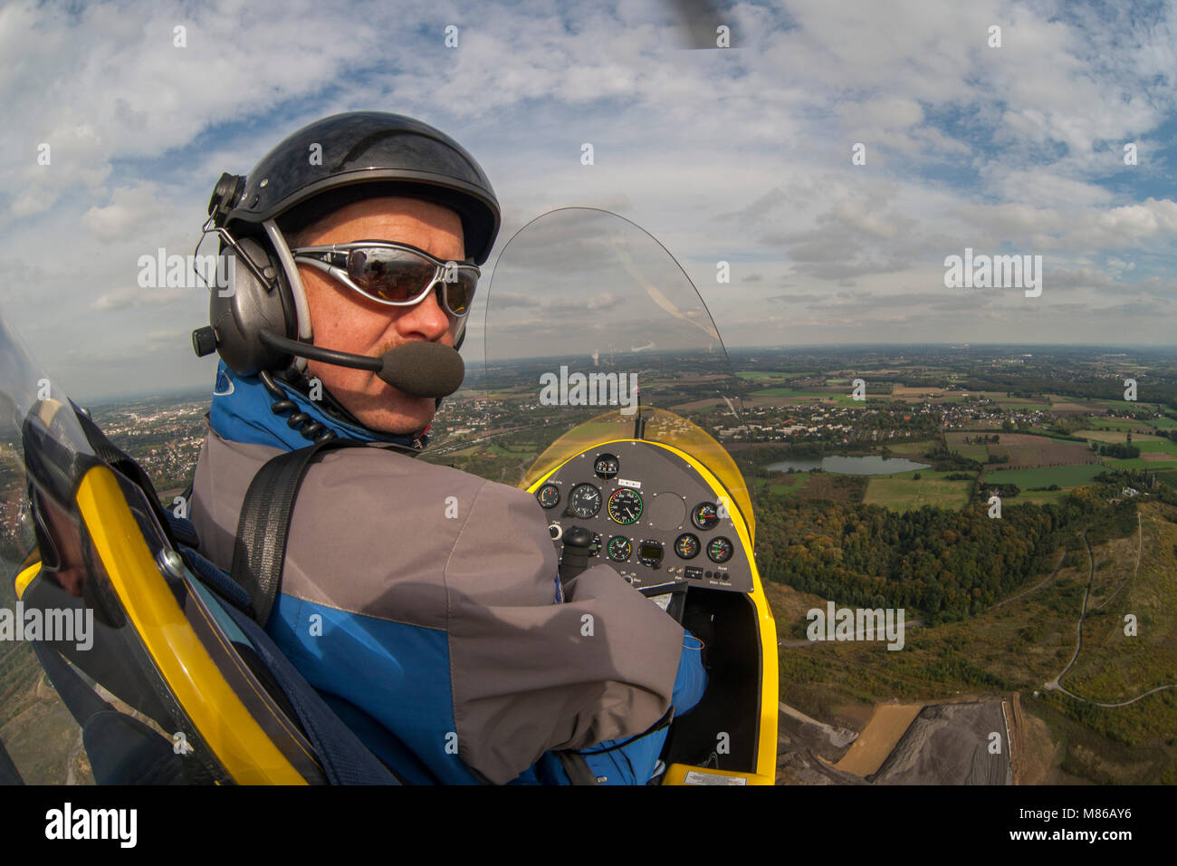 Aerial view, Gyro copter pilot, Gyrocopter with black helmet, Hamm ...