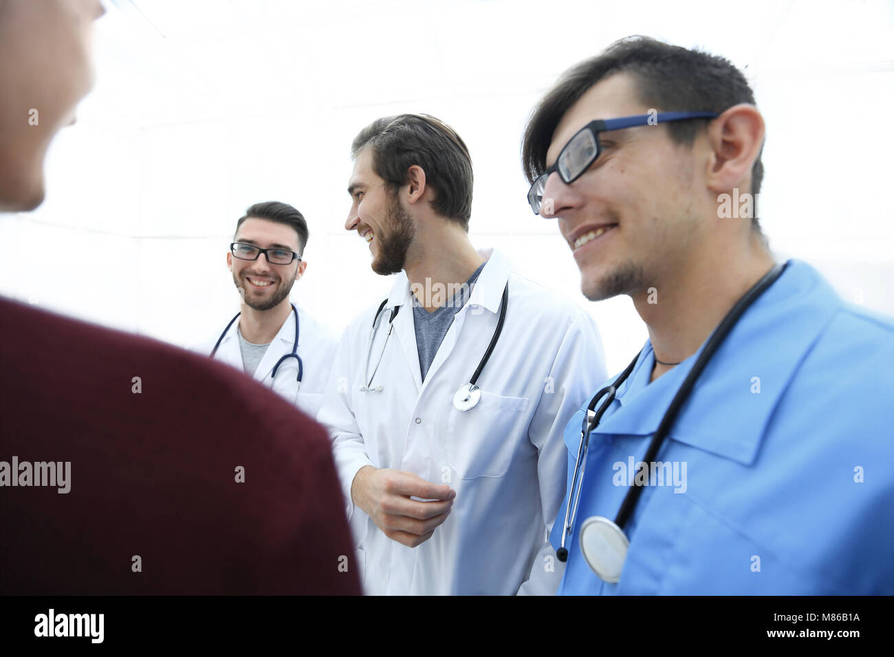 group of doctors advising the patient Stock Photo - Alamy