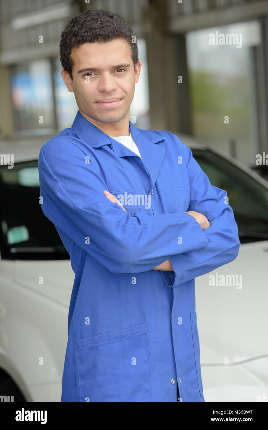 portrait of a mechanic standing near his car Stock Photo - Alamy