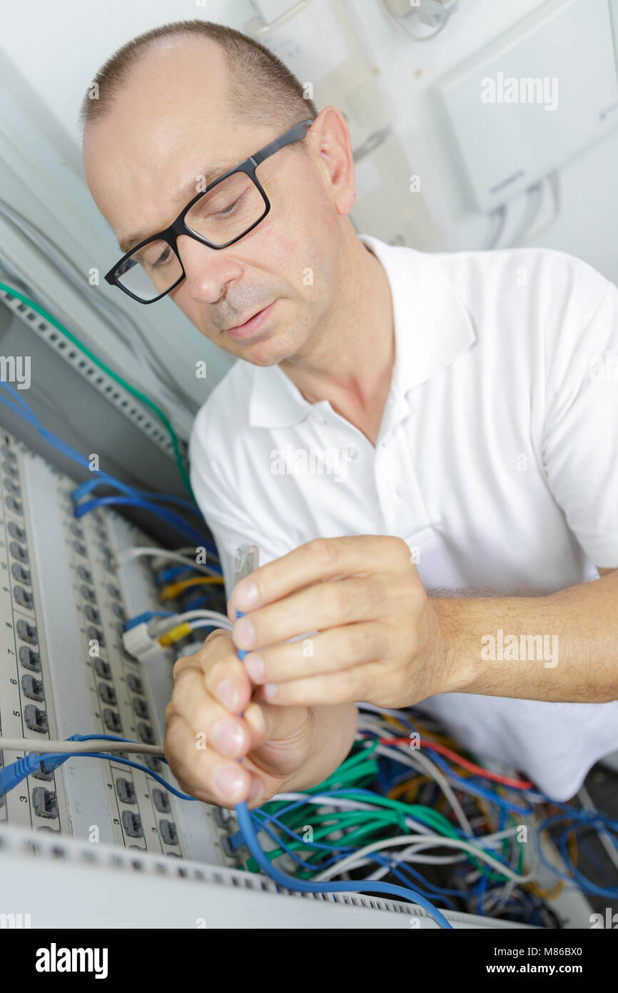man in a server room Stock Photo - Alamy