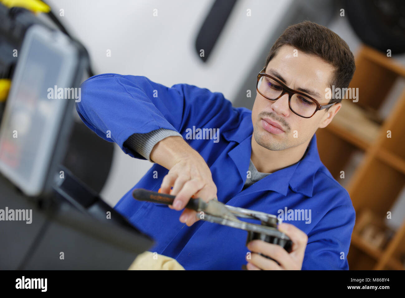 technician and his tool box Stock Photo - Alamy