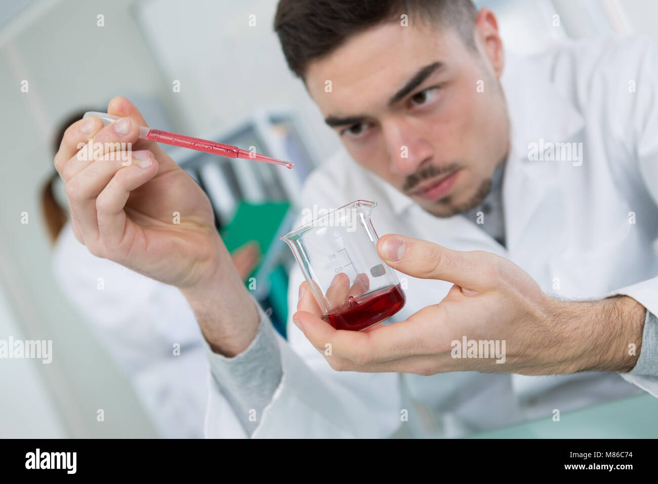 Male chemist hi-res stock photography and images - Alamy