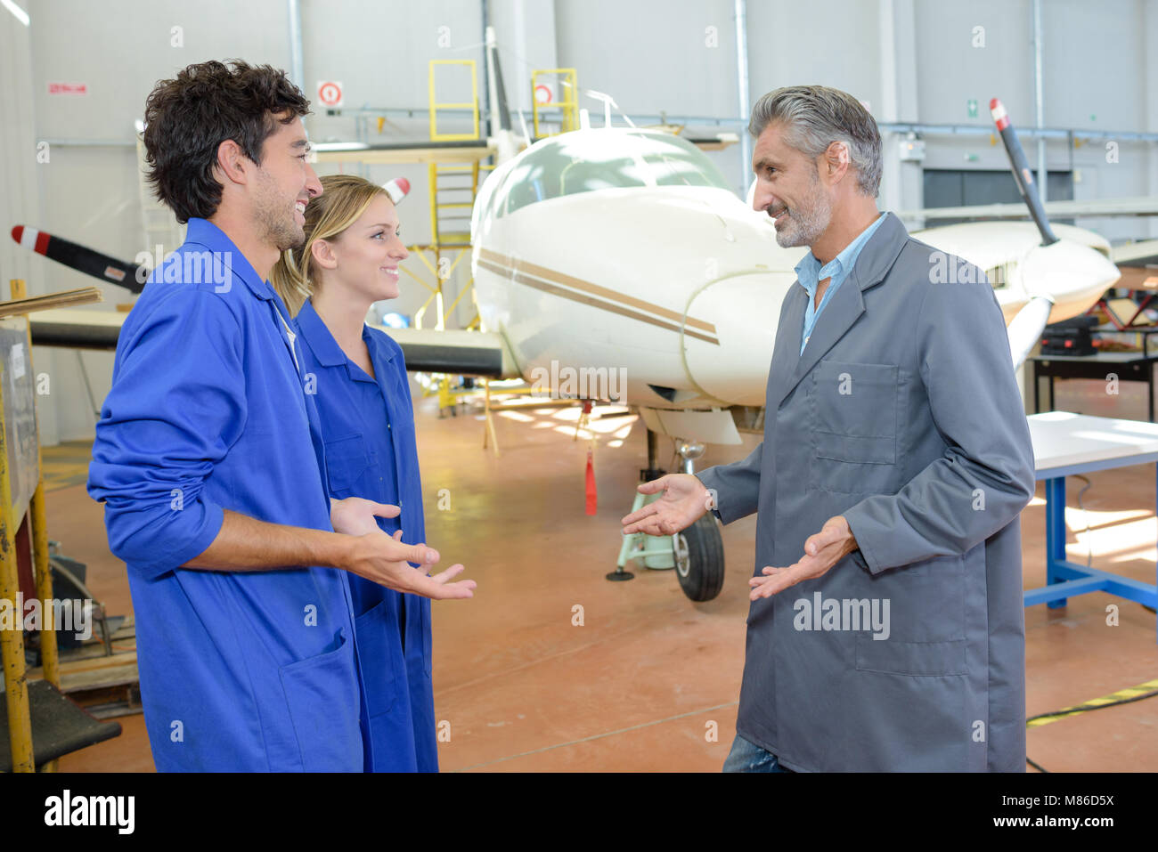 aeromechanics students and teacher during course Stock Photo - Alamy
