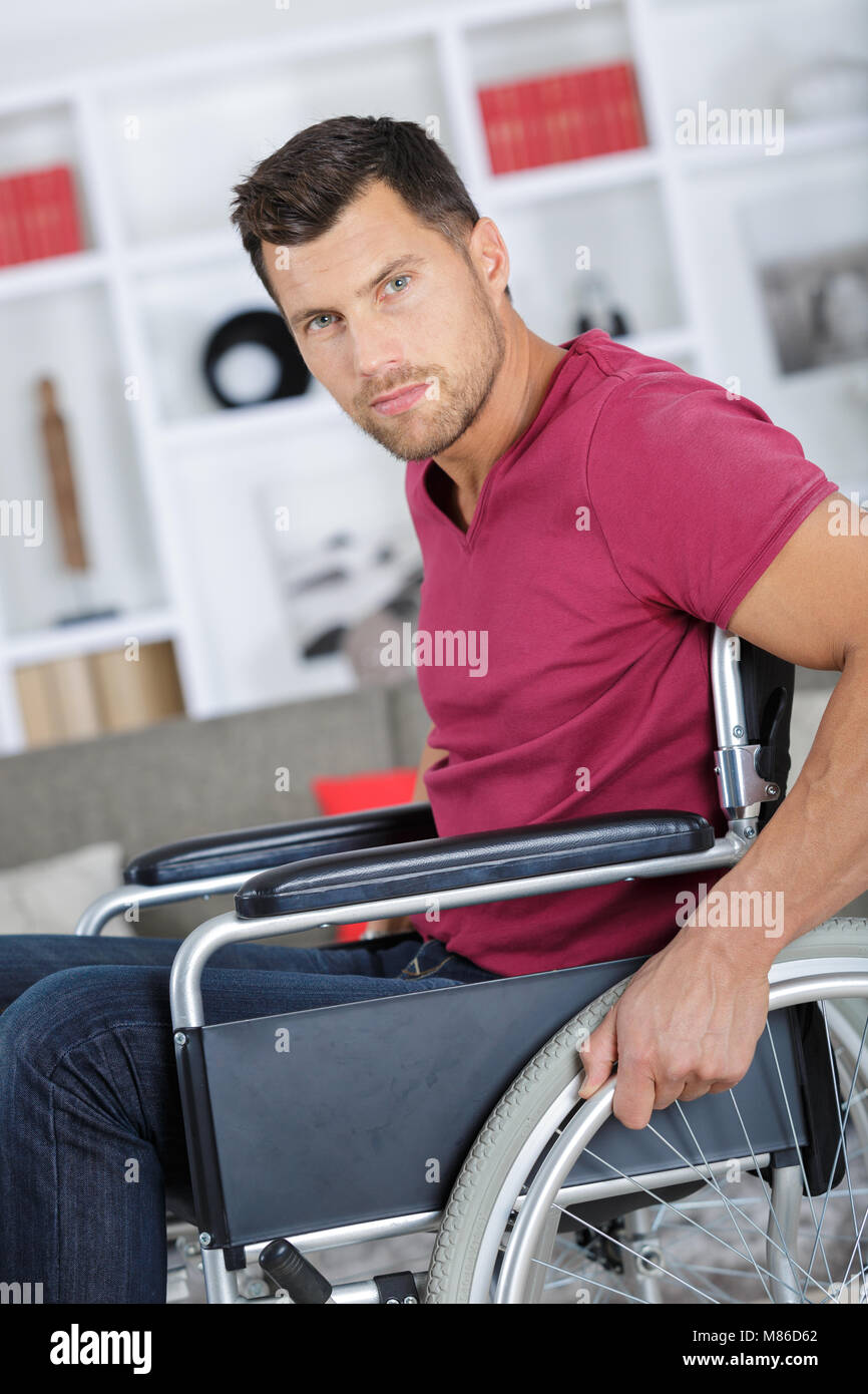 man on wheelchair posing Stock Photo - Alamy
