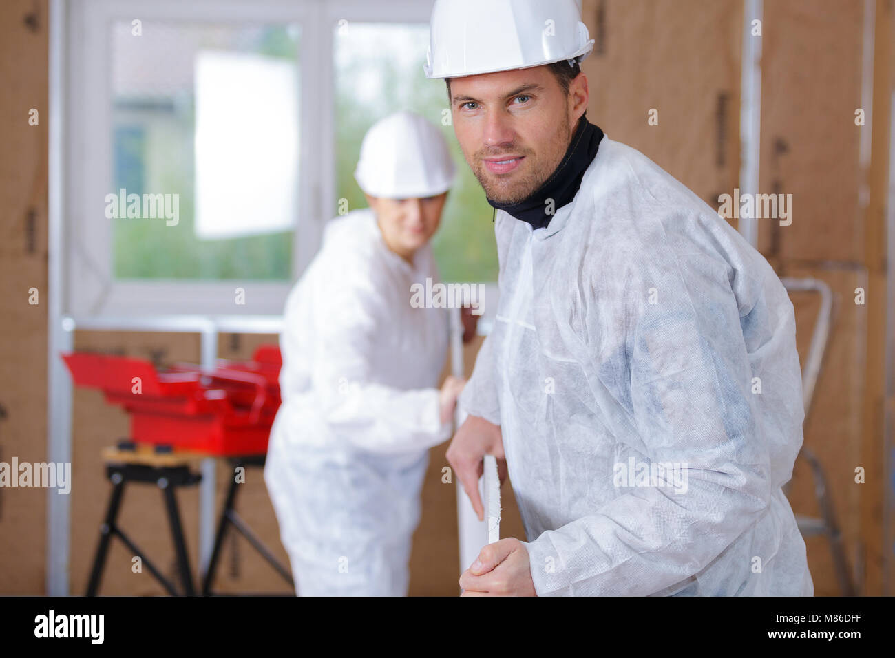 Man using level tool hi-res stock photography and images - Alamy