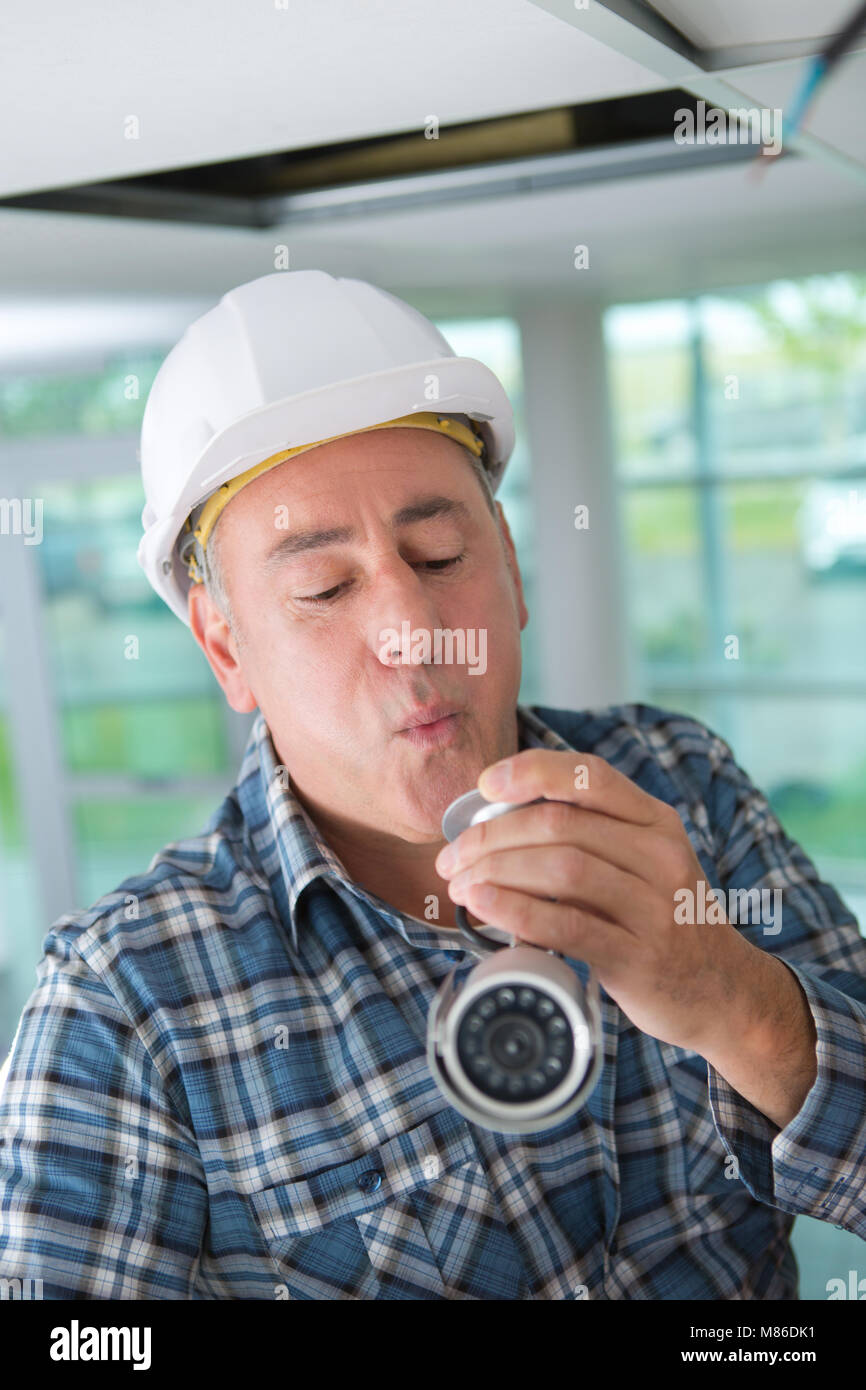 professional cctv technician working Stock Photo - Alamy