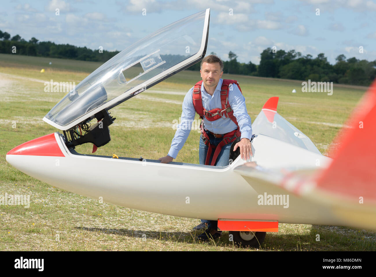 Portrait of man with sailplane Stock Photo - Alamy