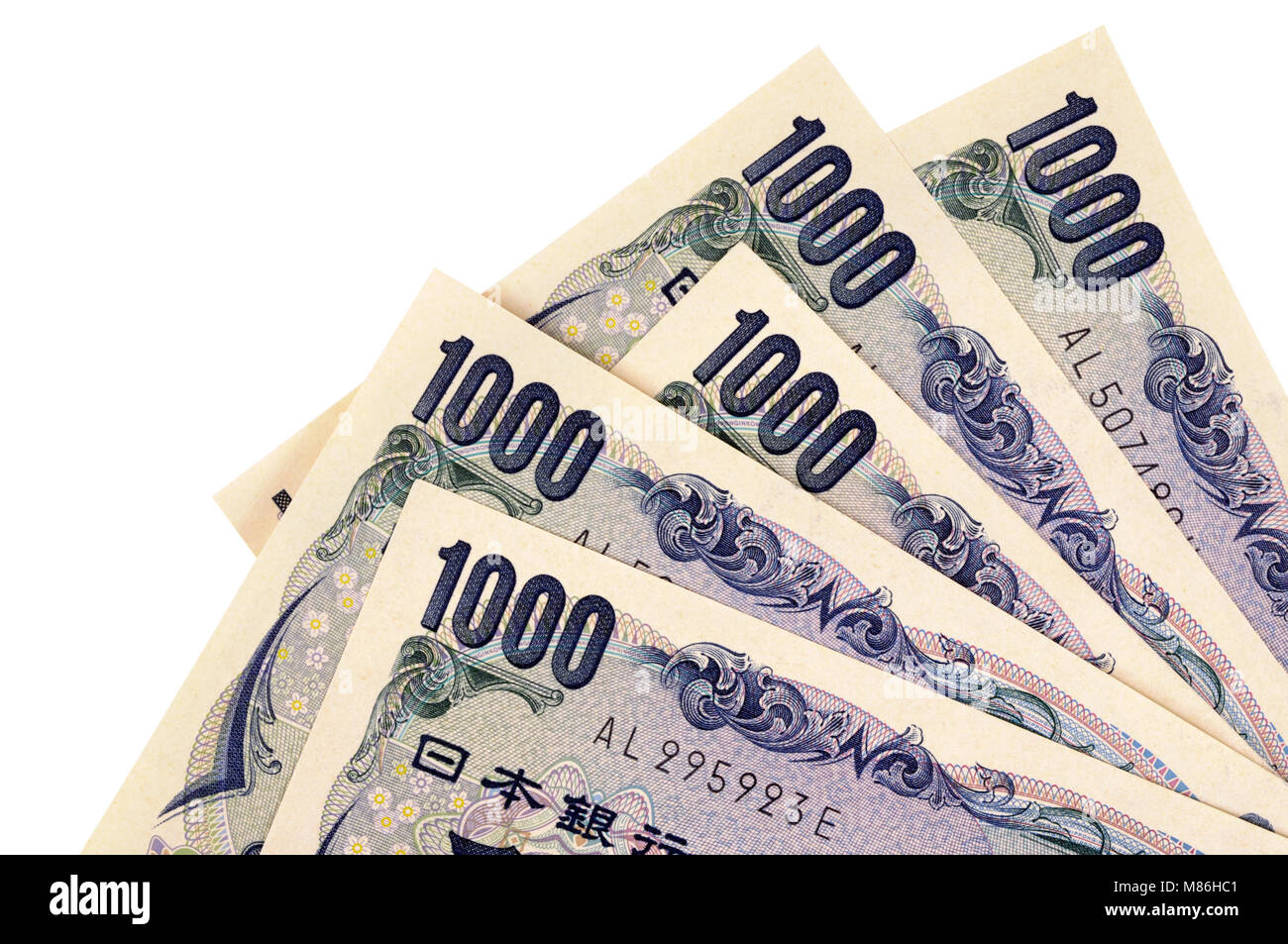 Several Japanese 1000 Yen currency bills isolated on a white background ...