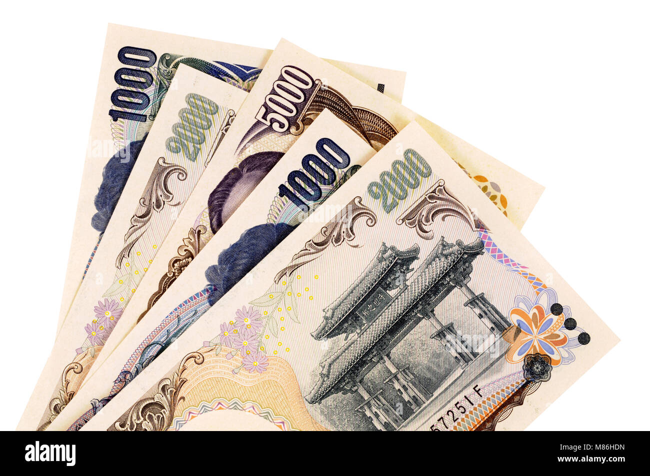 Selection of several different Japanese Yen currency bills isolated on ...