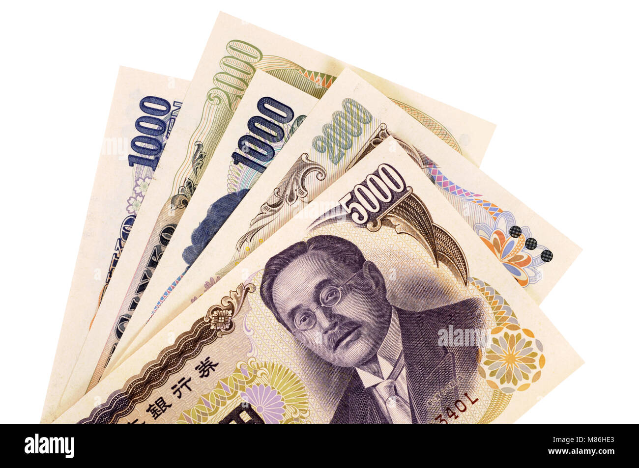 Selection of several different Japanese Yen currency bills isolated on ...