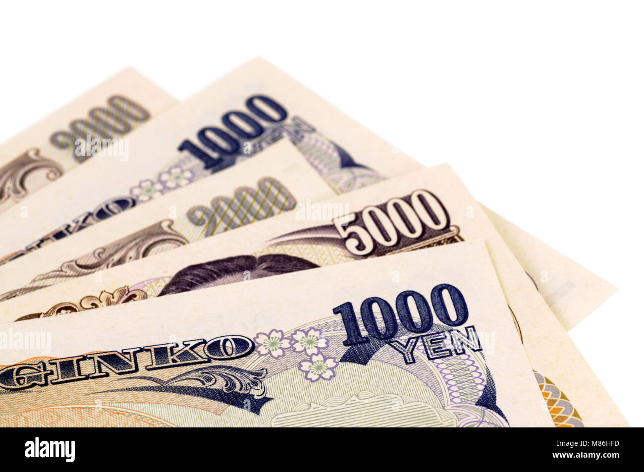 Selection of several different Japanese Yen currency bills isolated on ...