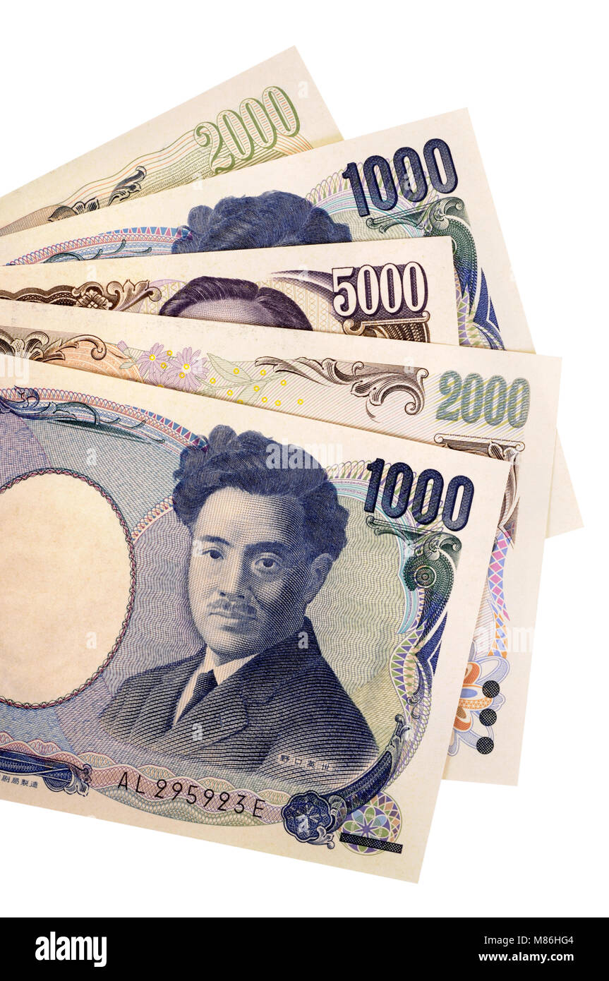 Selection of several different Japanese Yen currency bills isolated on ...