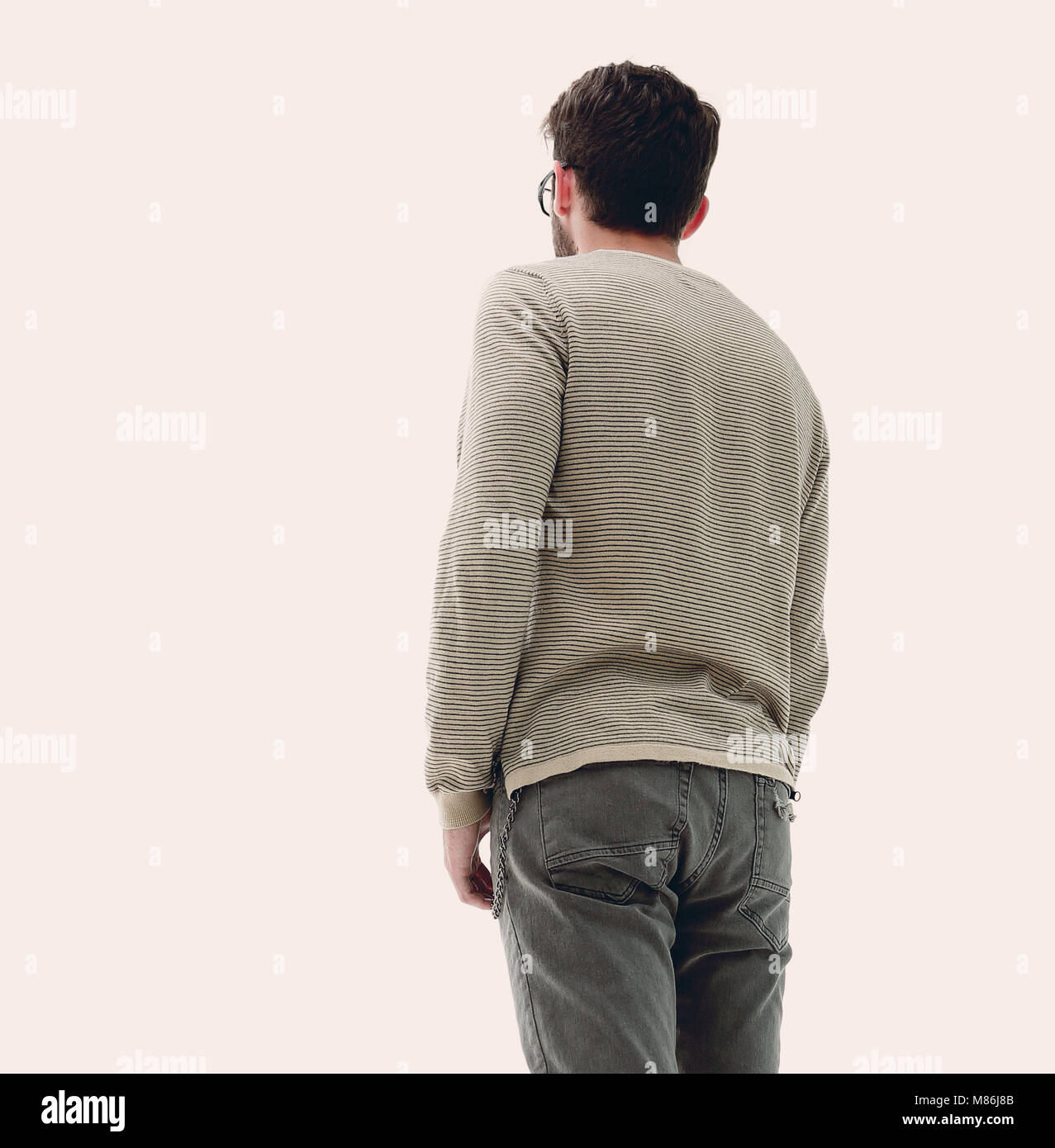 back view. Young modern man. Photo in full growth Stock Photo - Alamy