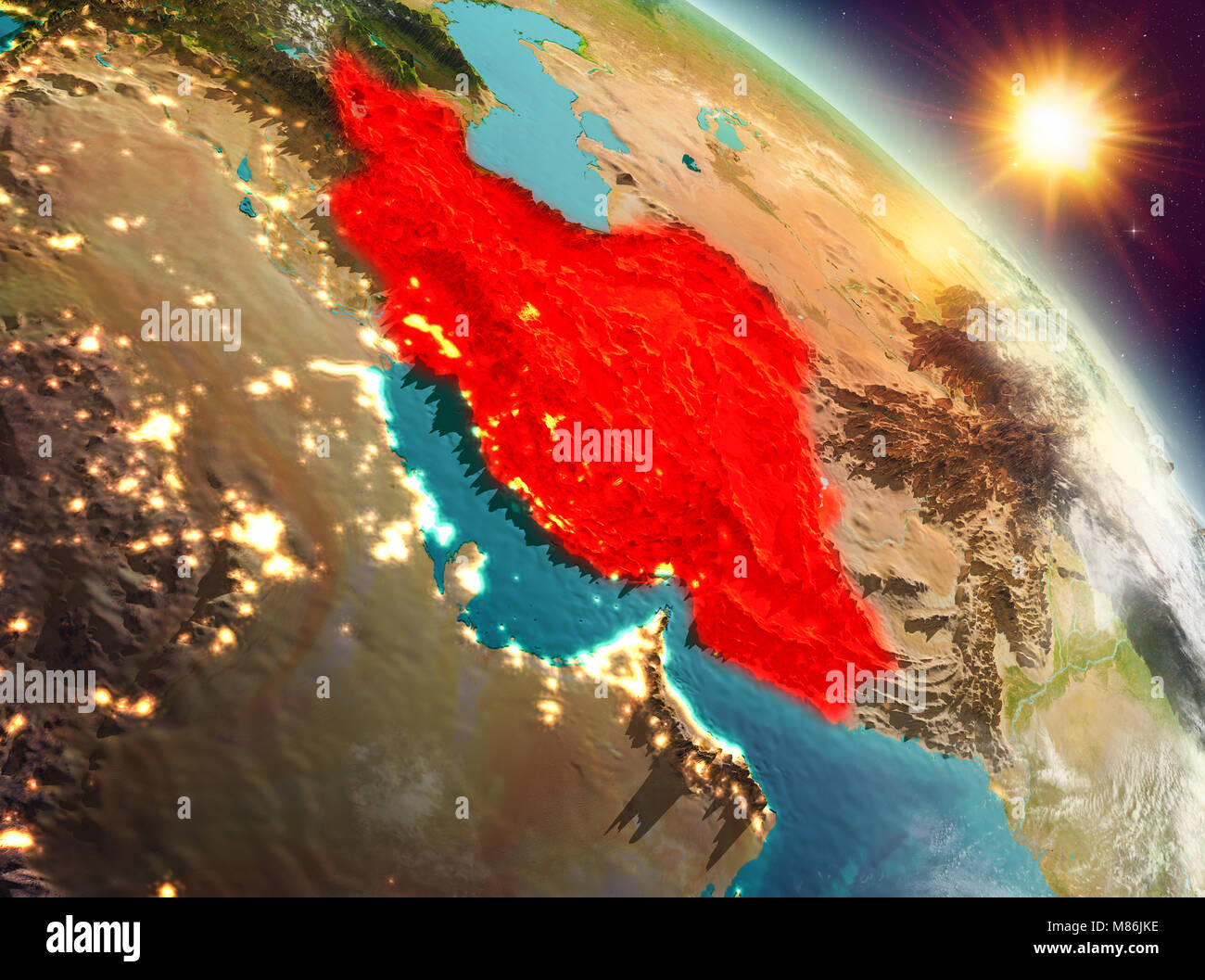 Sunrise above Iran highlighted in red on model of planet Earth in space ...