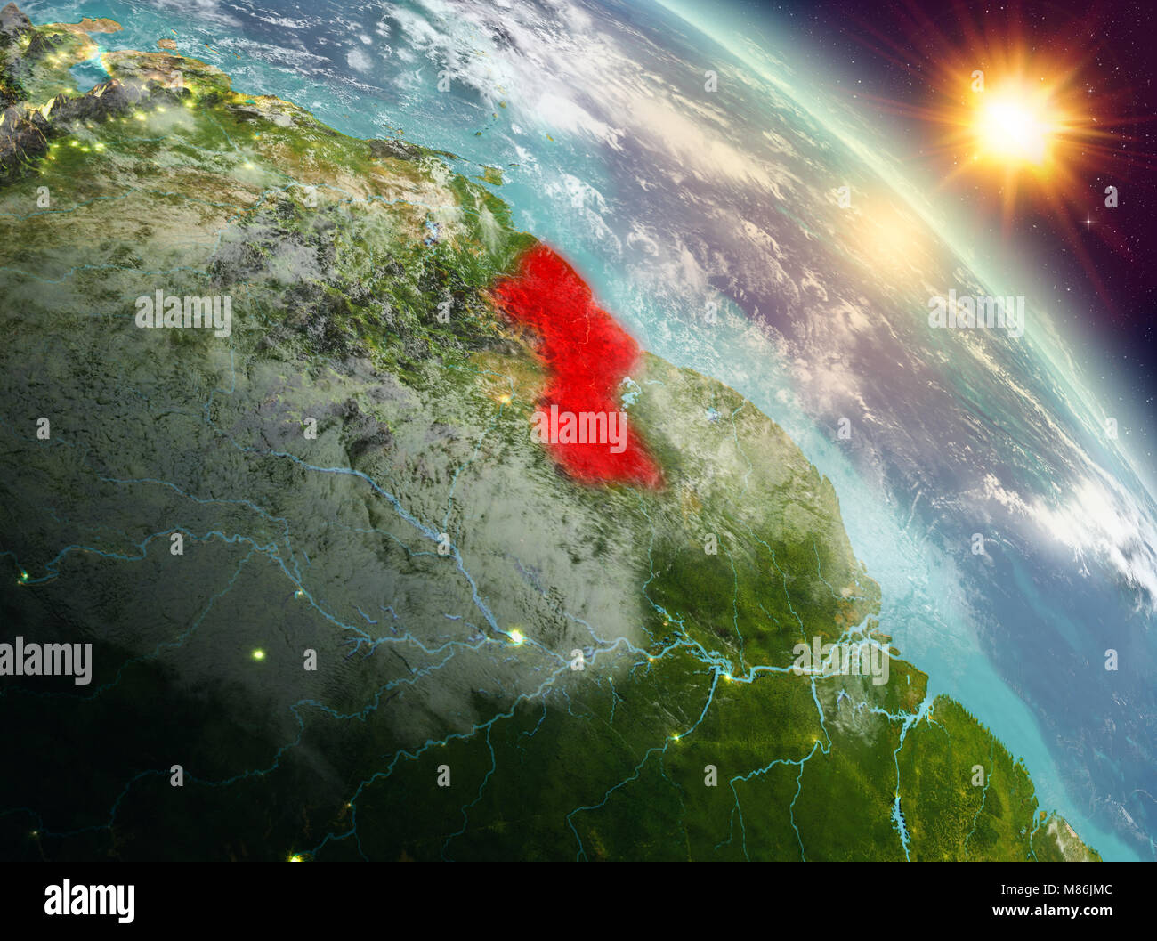 Sunrise above Guyana highlighted in red on model of planet Earth in ...
