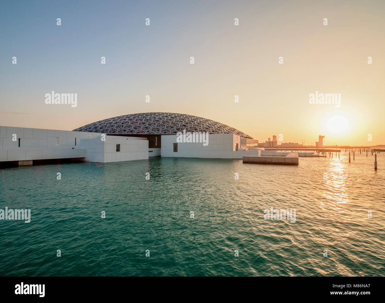 Louvre Museum at sunset, Abu Dhabi, United Arab Emirates Stock Photo ...