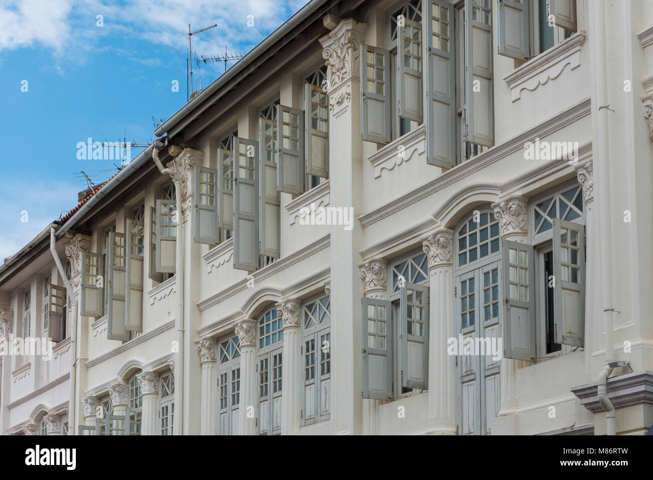 Facade of old colonial-era building in Chinatown, downtown Singapore ...