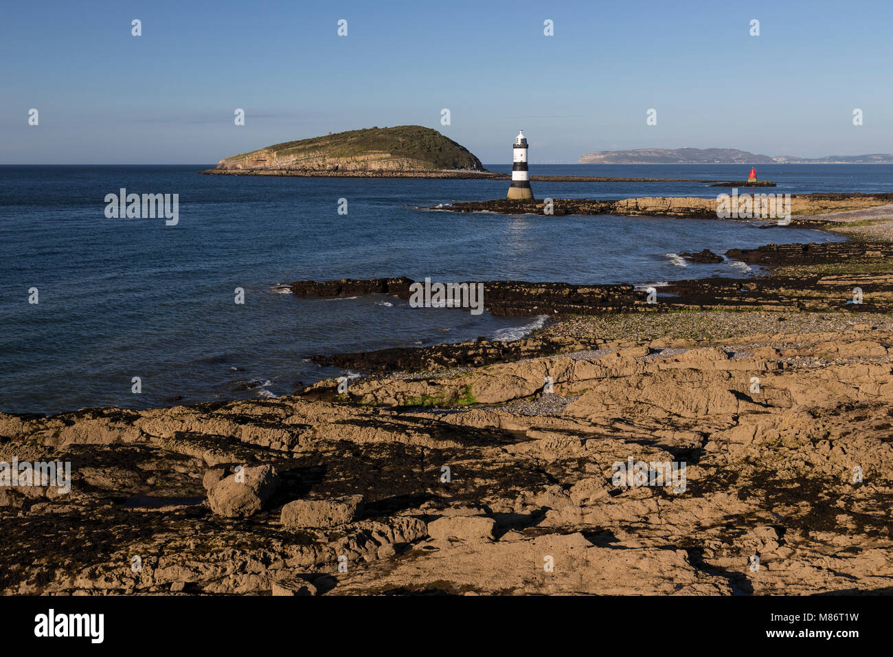 Penmon lighthouse and Puffin Island, Anglesey, North Wales coast Stock ...