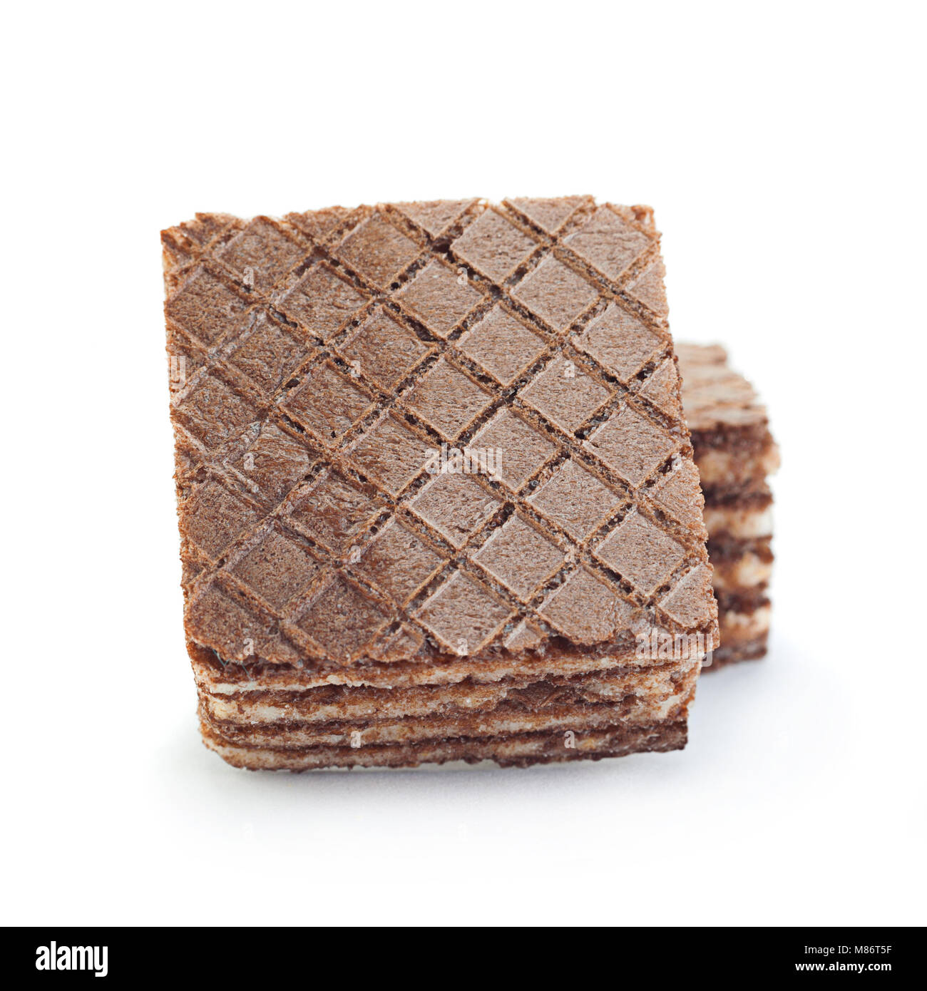 Brown square wafers stick isolated on white Stock Photo - Alamy