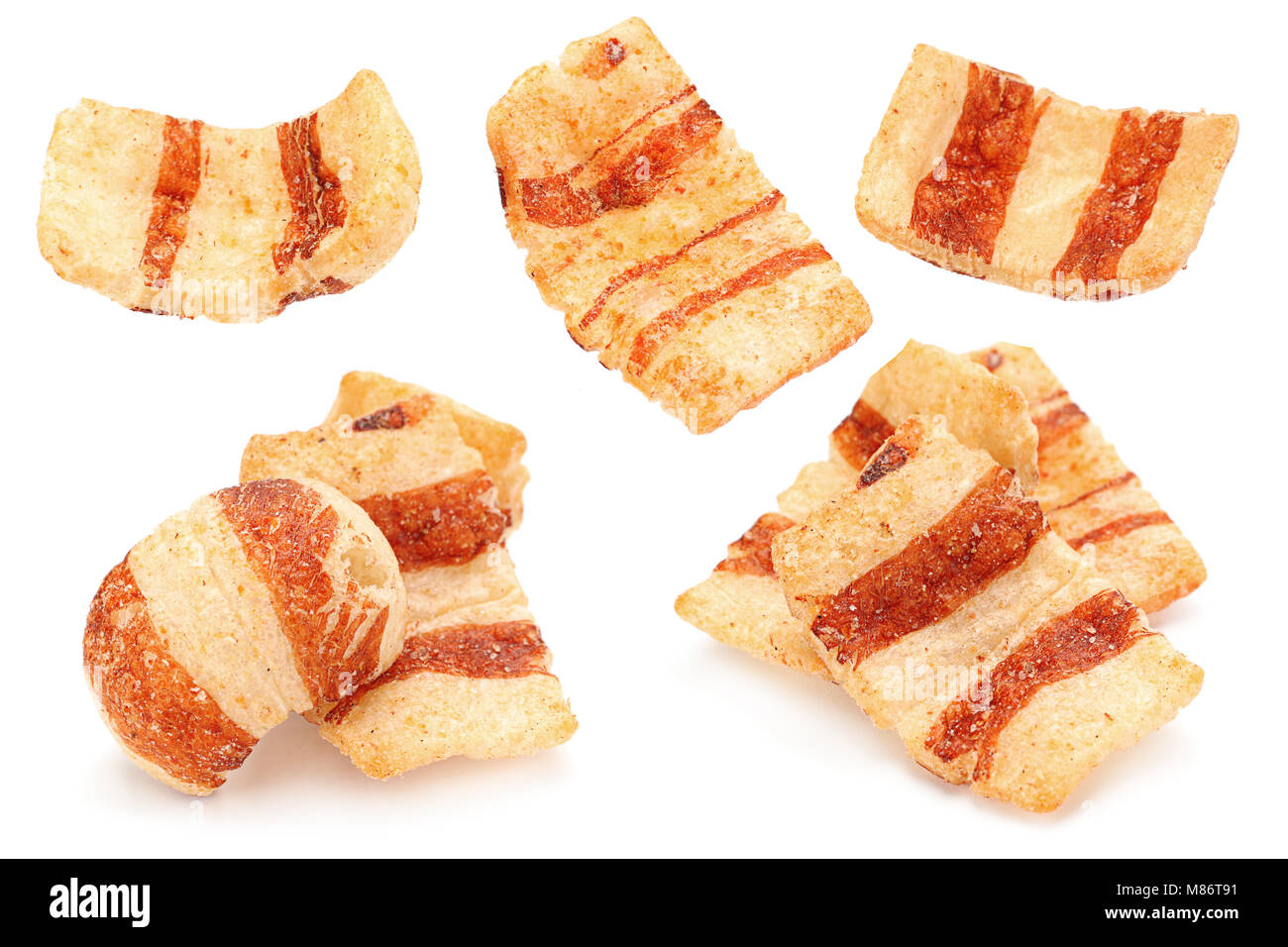 Pelleted snack bacon set isolated on white background Stock Photo - Alamy