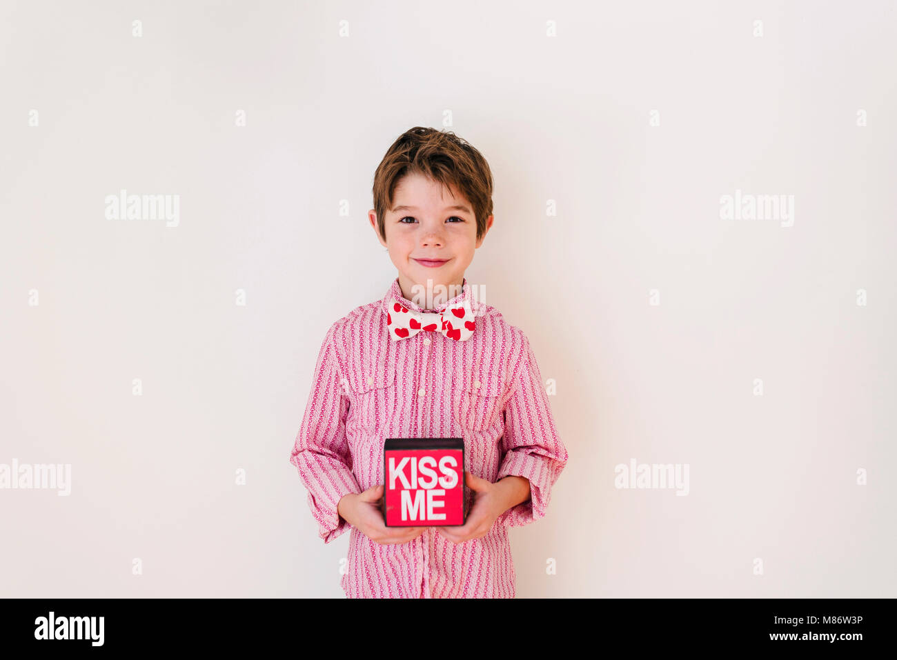 Boy wearing bow tie hi-res stock photography and images - Alamy