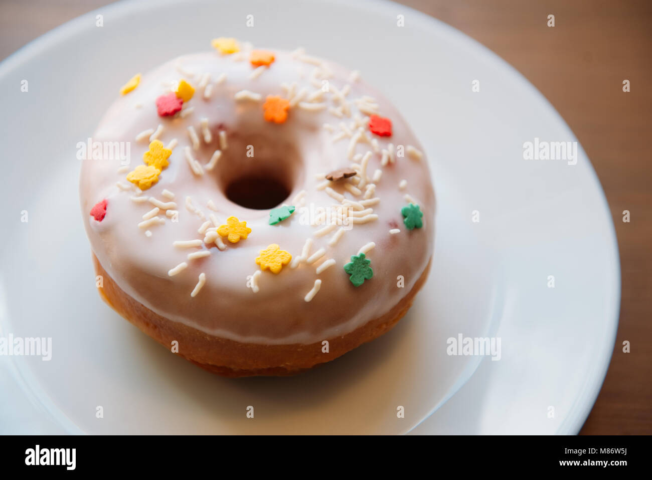 Donut on a plate Stock Photo - Alamy