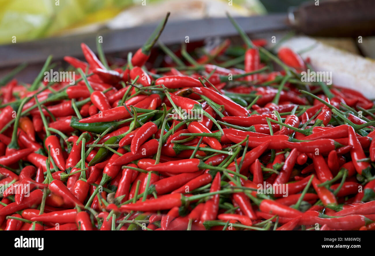 Close-up of chillies in street market, Vietnam Stock Photo - Alamy