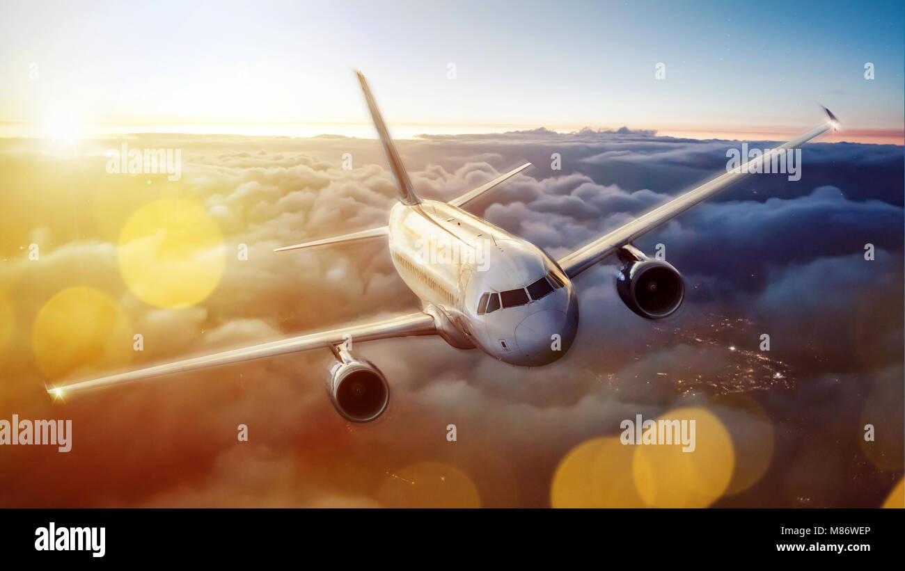 Fly over sunset above clouds hi-res stock photography and images - Alamy