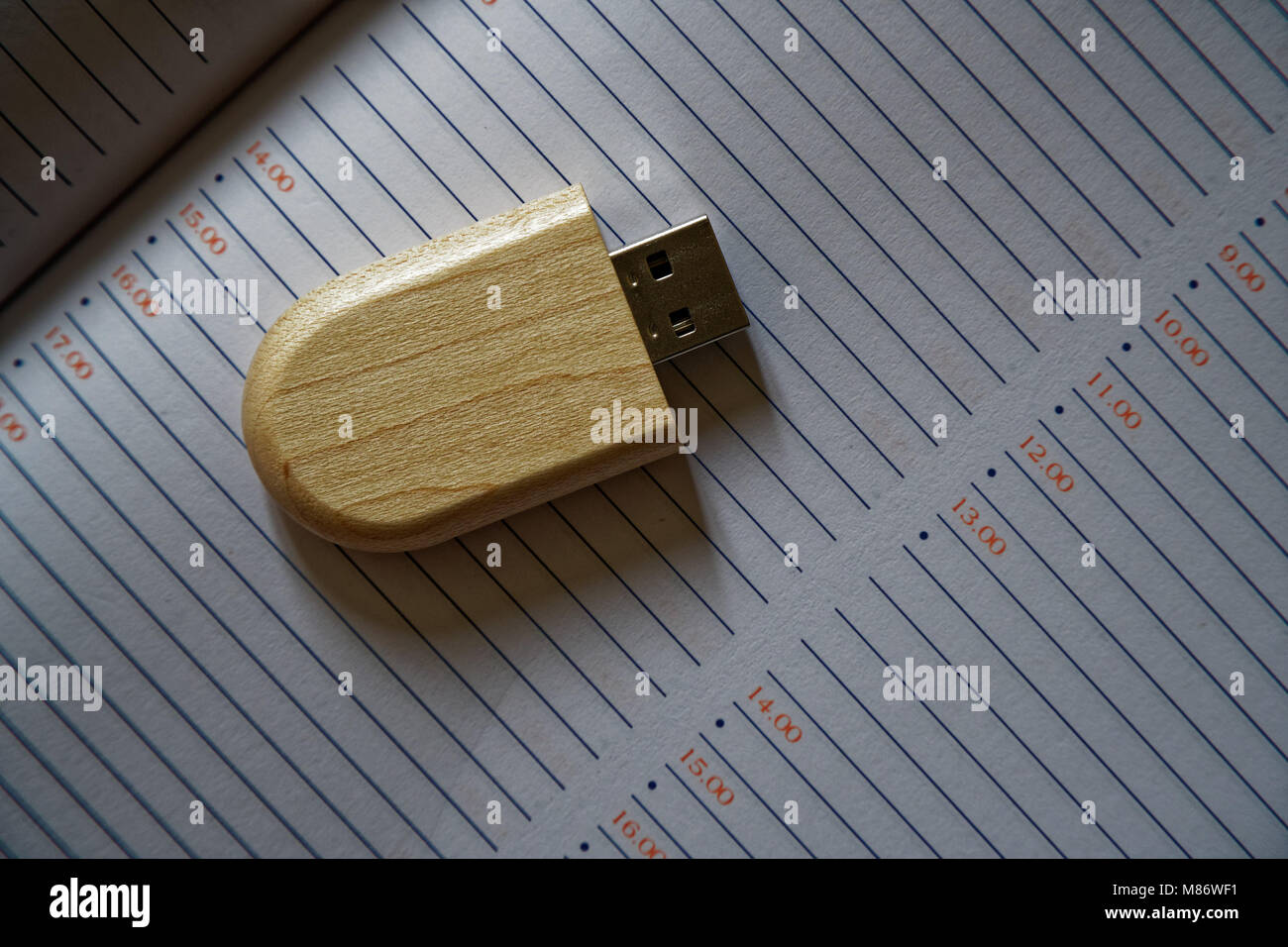 Usb flash drive with wooden surface on note page for USB port plug-in ...