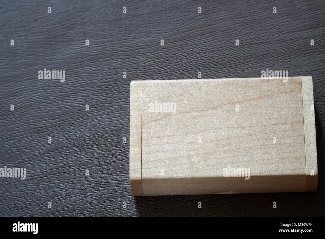 Usb flash drive with wooden surface in wooden box on desk for USB port ...