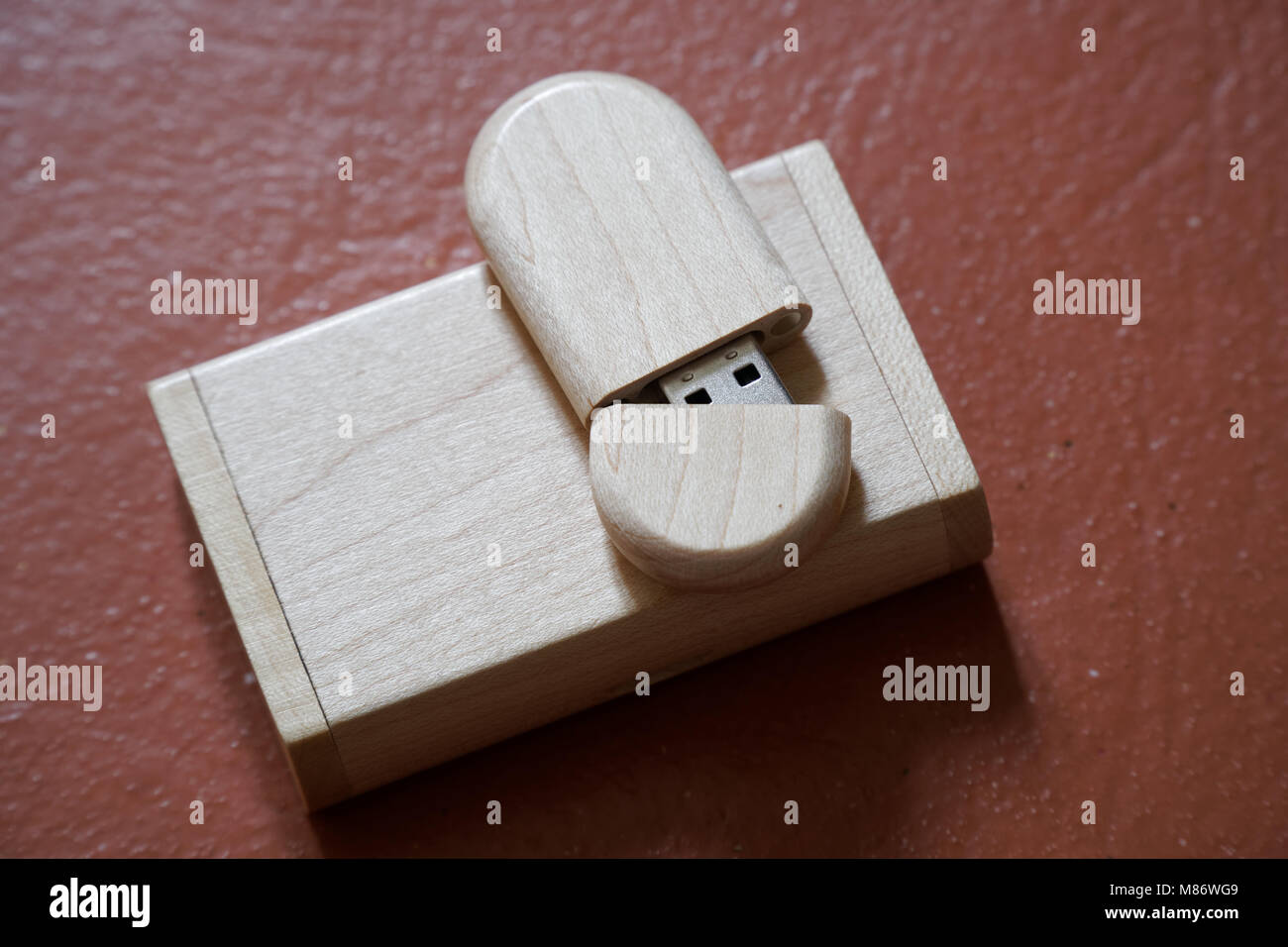 Usb flash drive with wooden surface on desk for USB port plug-in ...