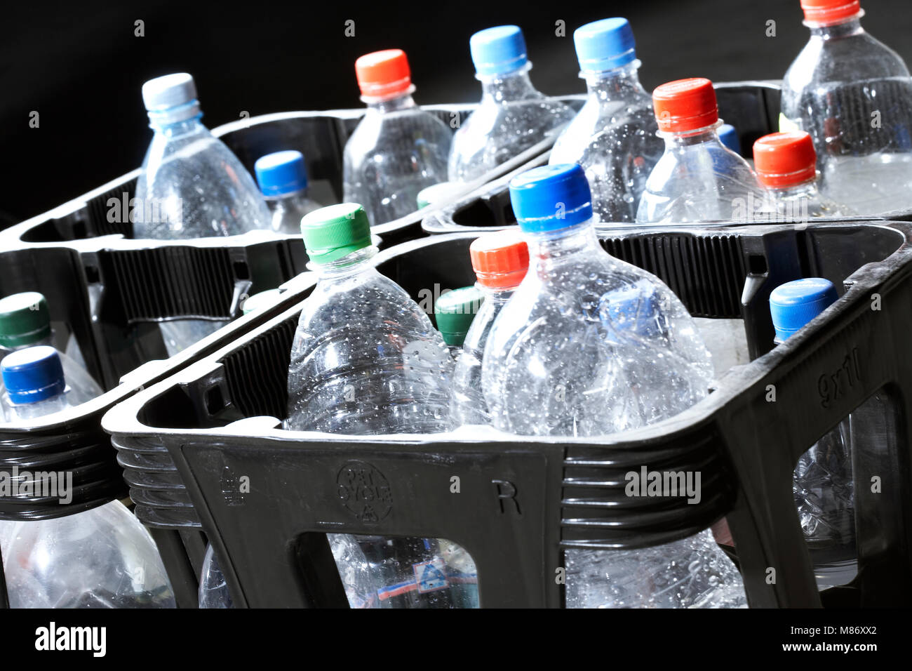 plastic bottles in a bottle box Stock Photo - Alamy