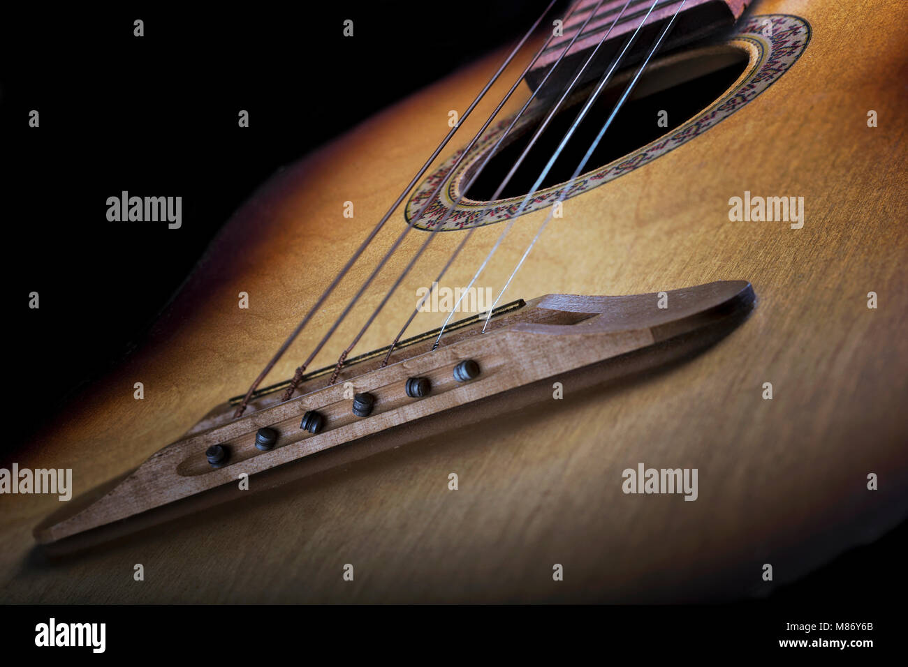 Guitar on a black background Stock Photo - Alamy