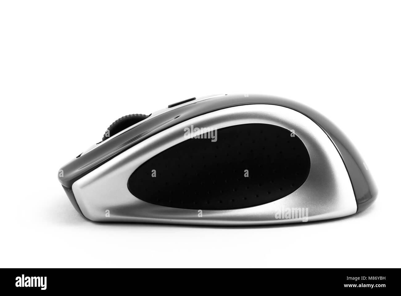 computer mouse with traces of usage on white background - side view ...