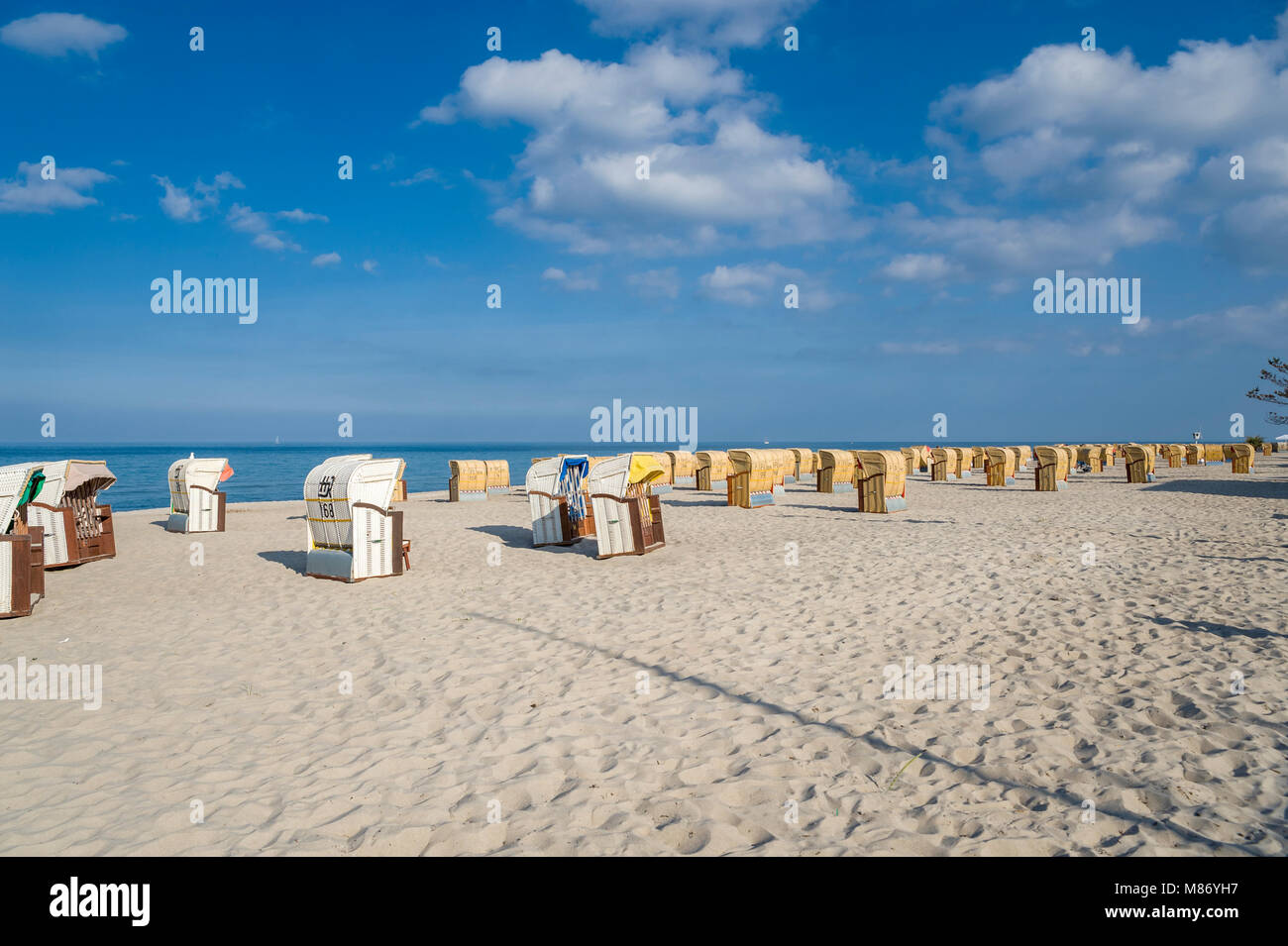 Beach and canopied wicker beach chair, Dahme, Baltic Sea, Schleswig ...