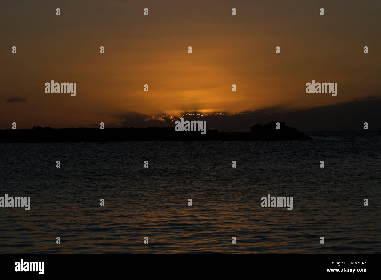 Beautiful orange sunset at Pokai beach park in Waianae, Hawaii Stock ...