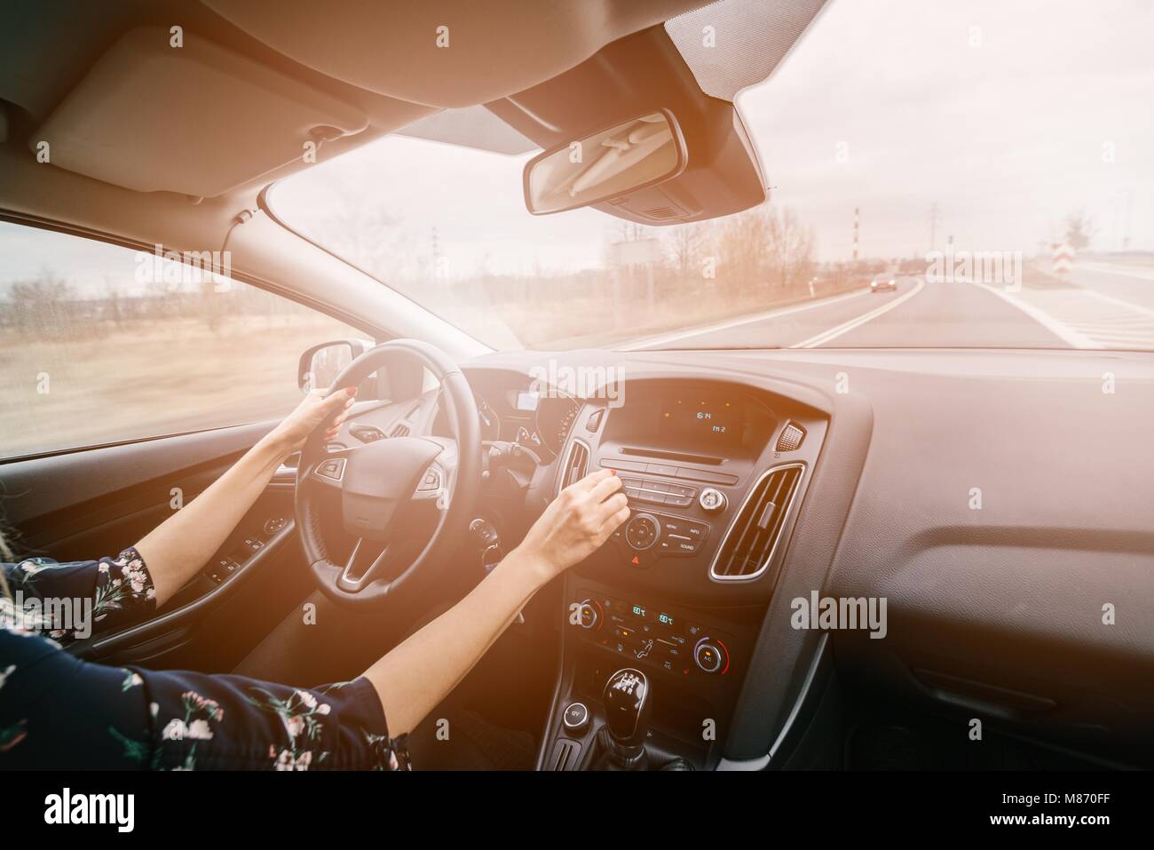 Changing radio in car driving hi-res stock photography and images - Alamy