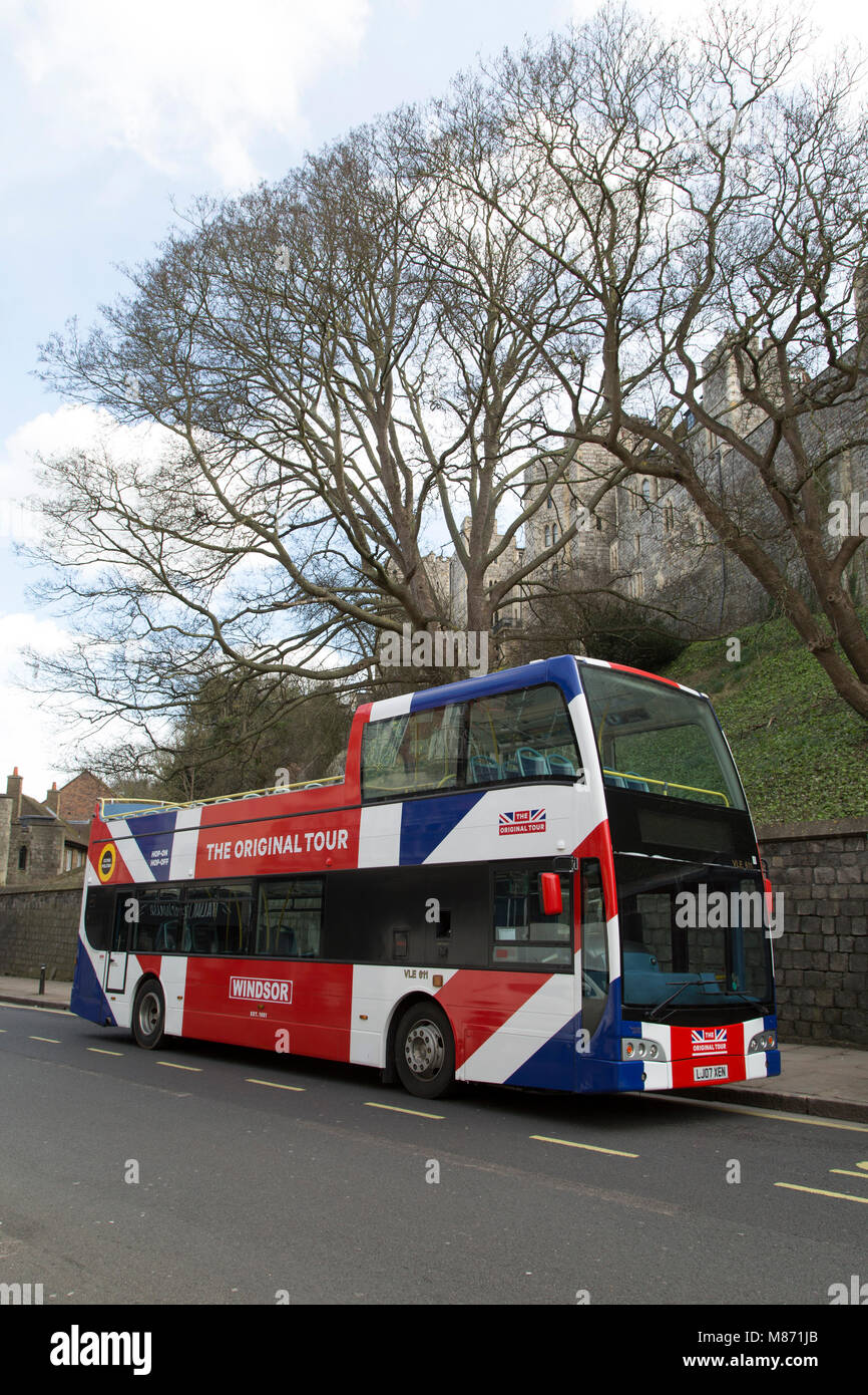 Double-decker tour bus in Windsor, England. The open-topped bus is ...