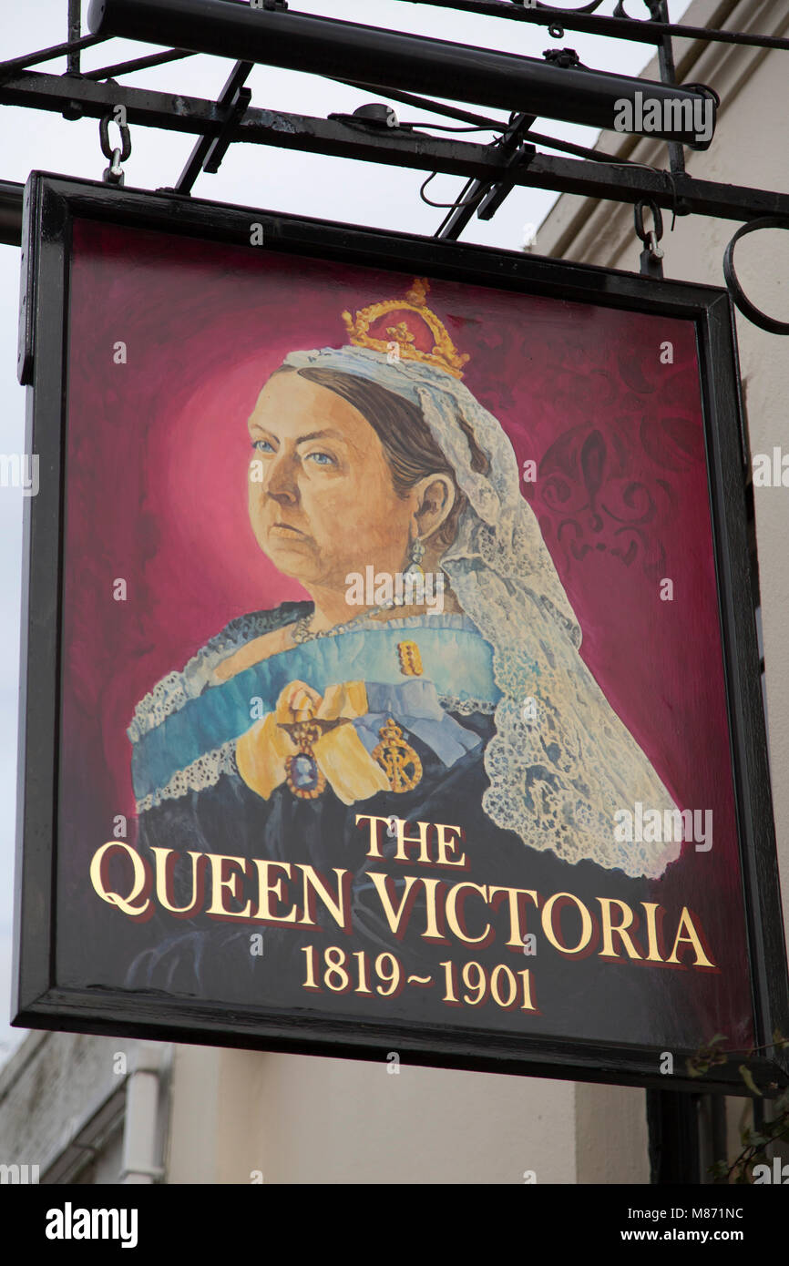Sign for The Queen Victorian pub in Windsor, England. The sign for the ...