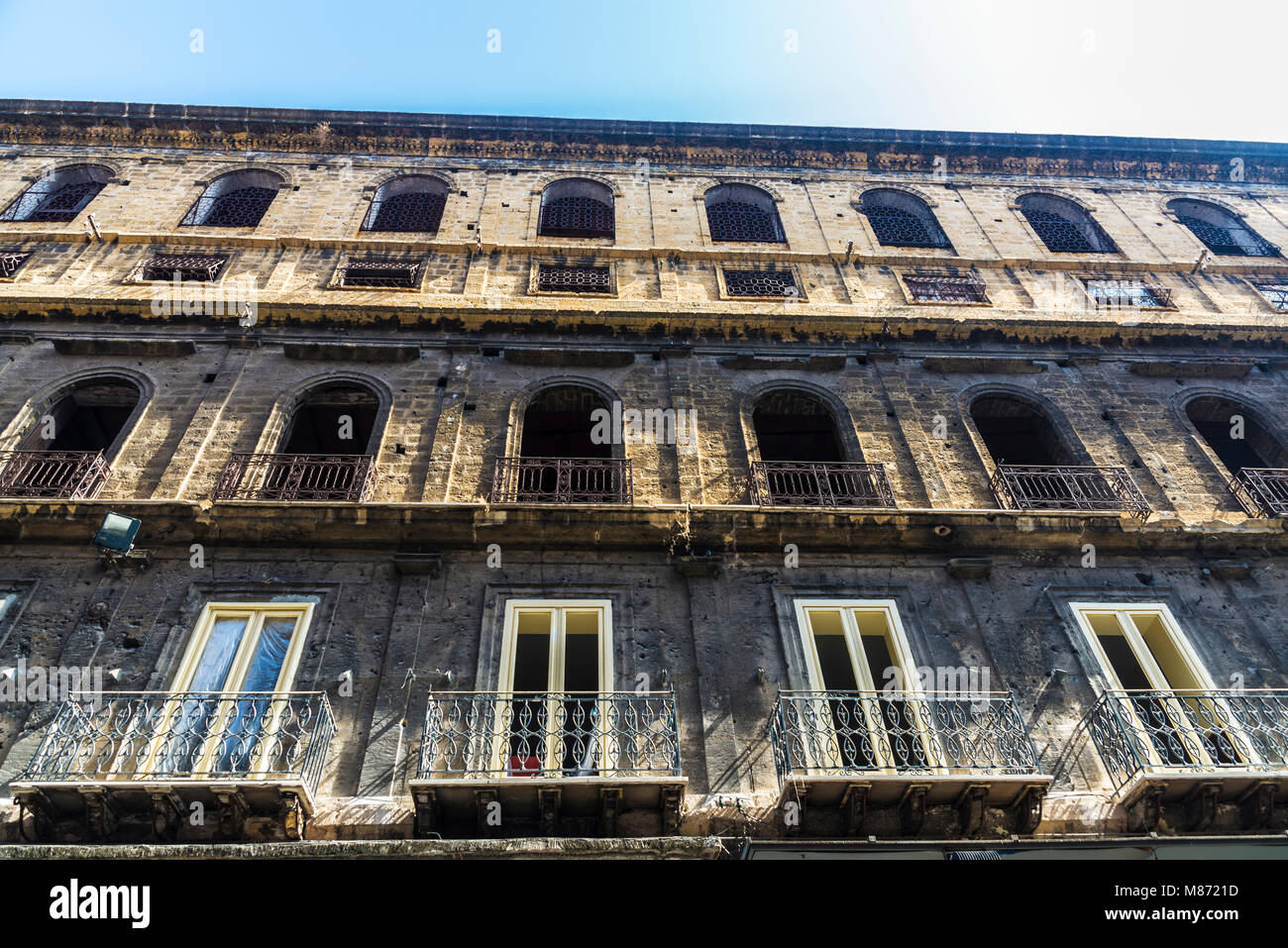 Facade of an old building under restoration in the old town of Palermo ...