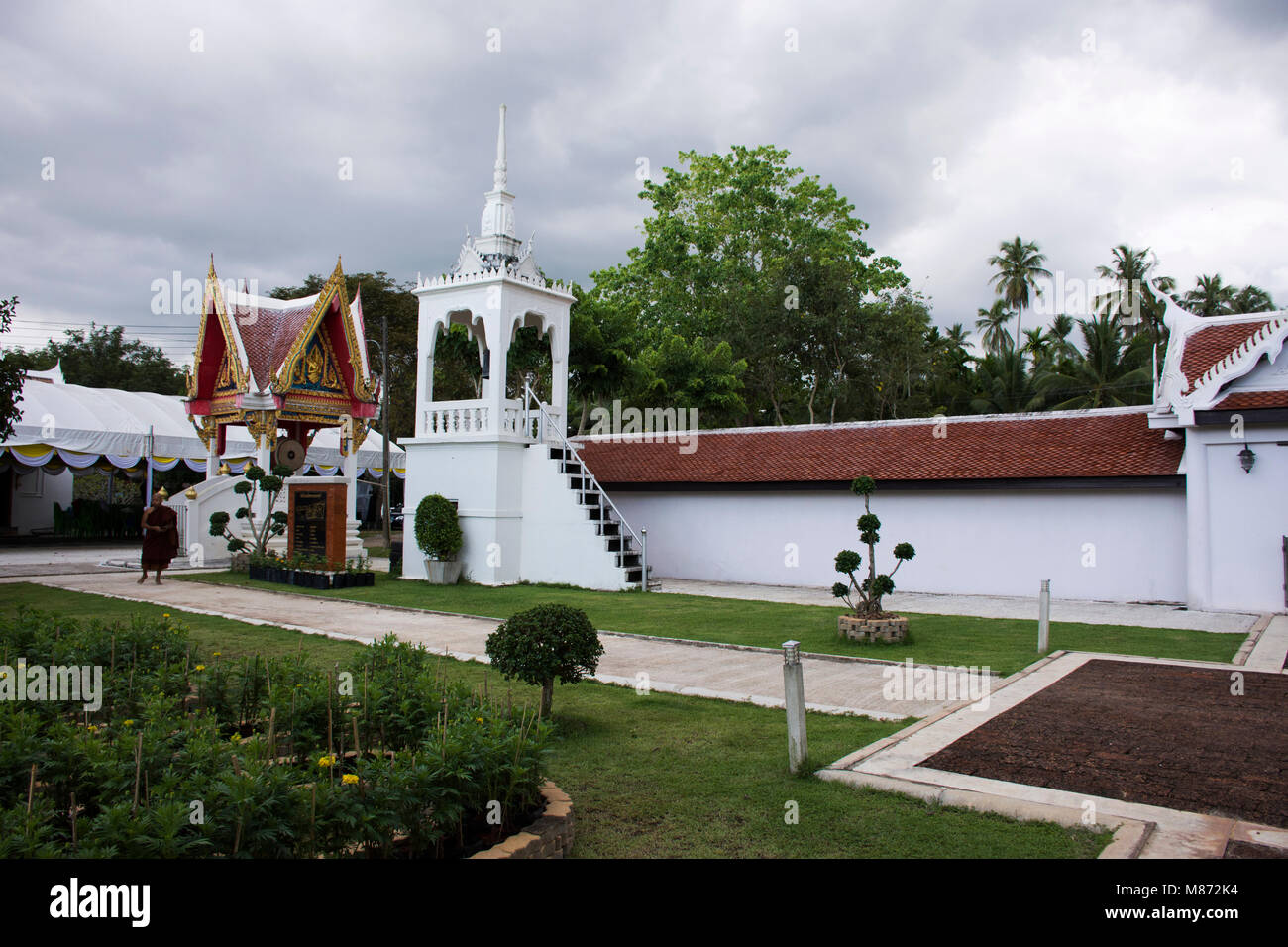 Thai people and foreigner travelers visit with praying golden chedi and ...