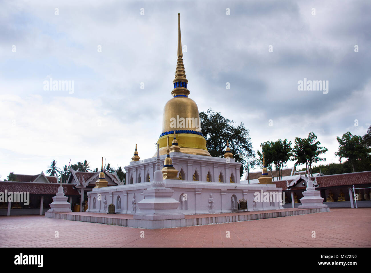 Thai people and foreigner travelers visit with praying golden chedi and ...