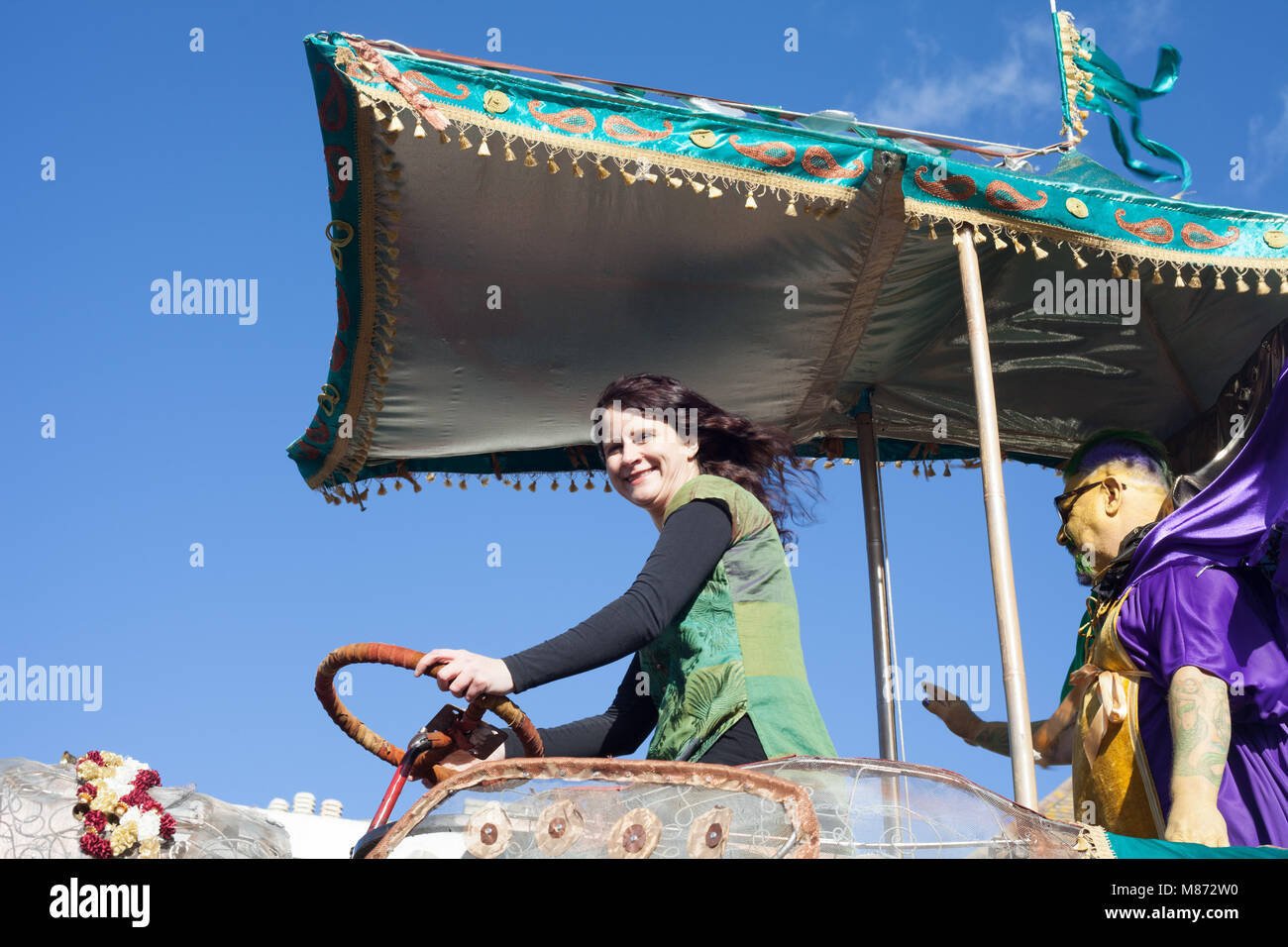 Participants in costumes on top of an elephant during the annual Fat ...