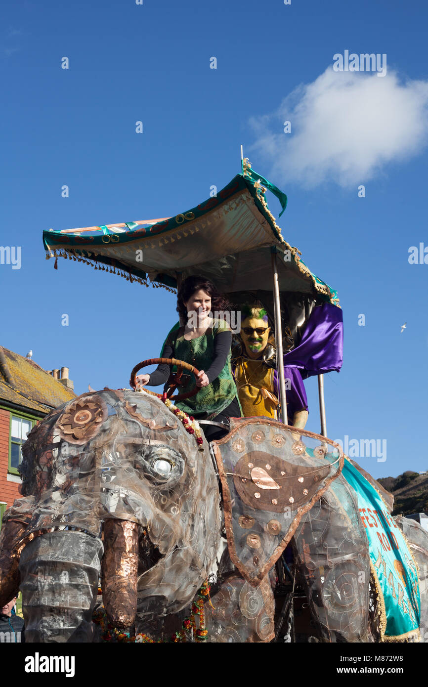 Participants in costumes on top of an elephant during the annual Fat ...