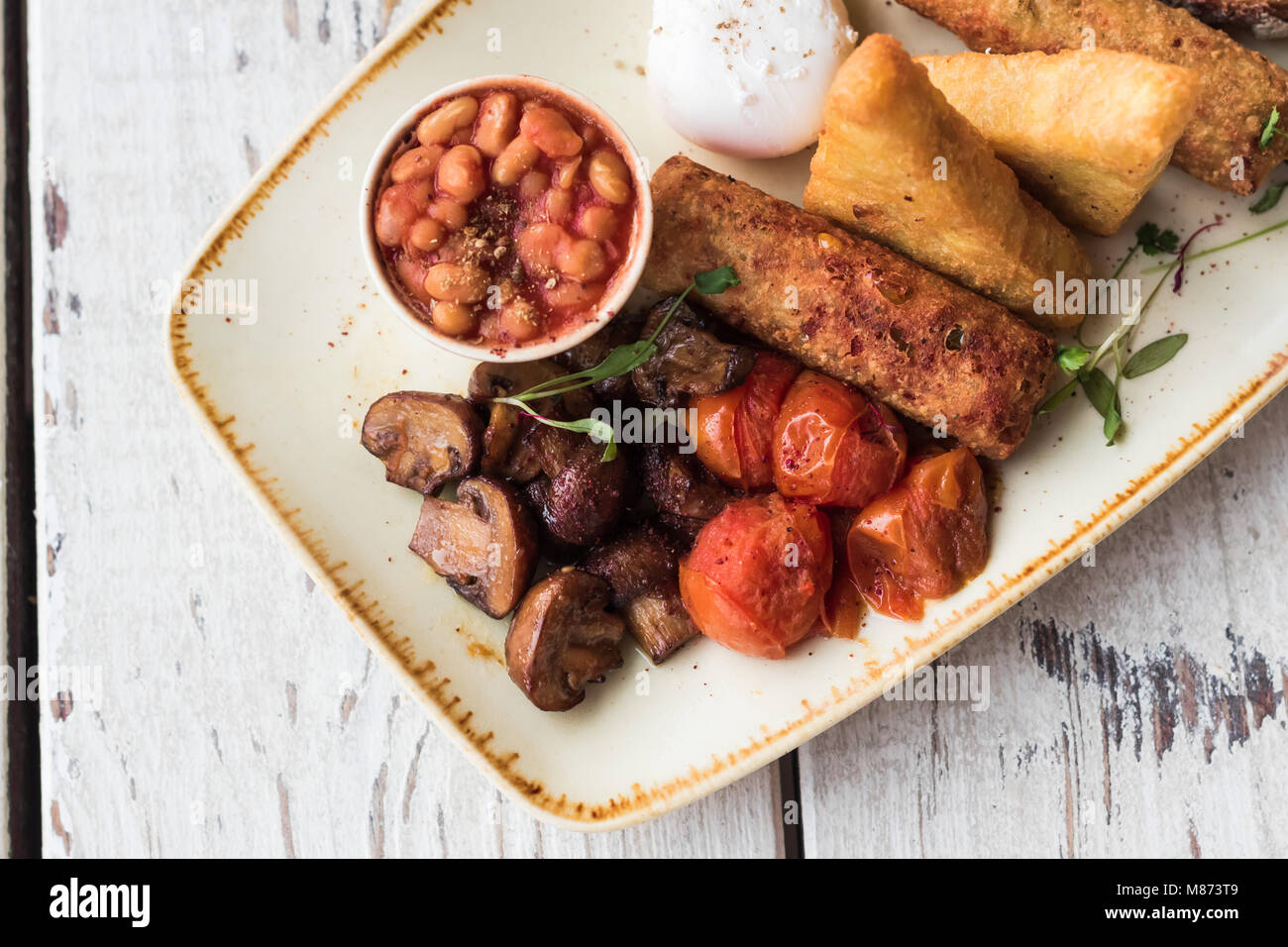 Cooked breakfast vegetarian eggs Stock Photo - Alamy