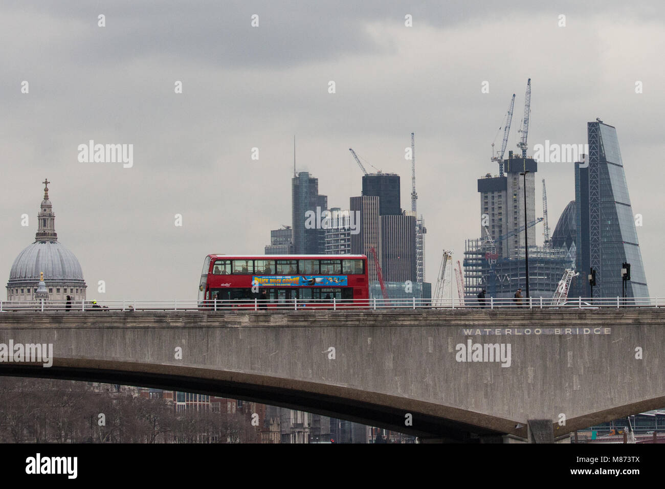 London, UK. 13th March, 2018. A doubledecker bus crosses Waterloo ...