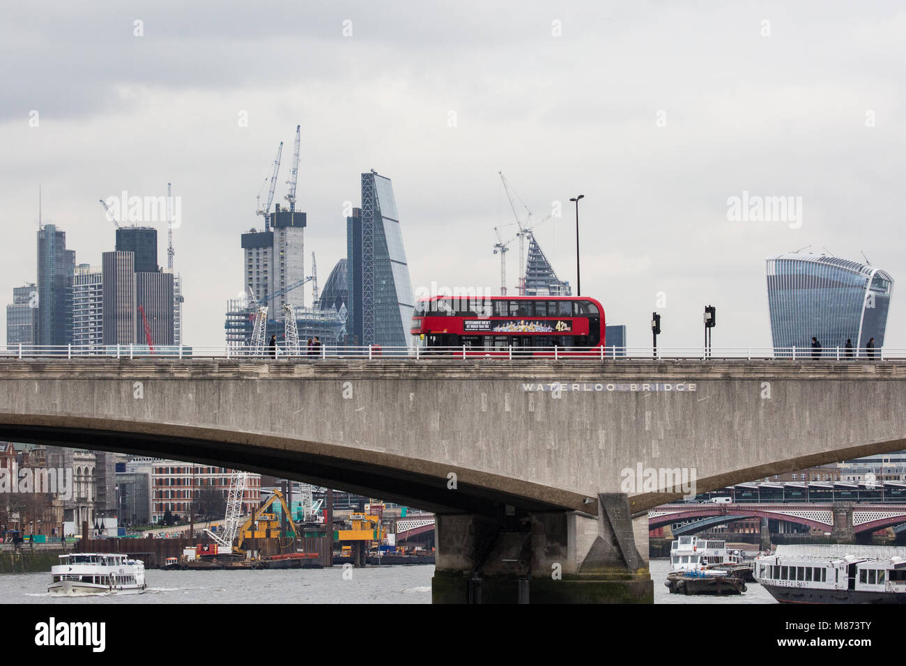 London, UK. 13th March, 2018. A doubledecker bus crosses Waterloo ...