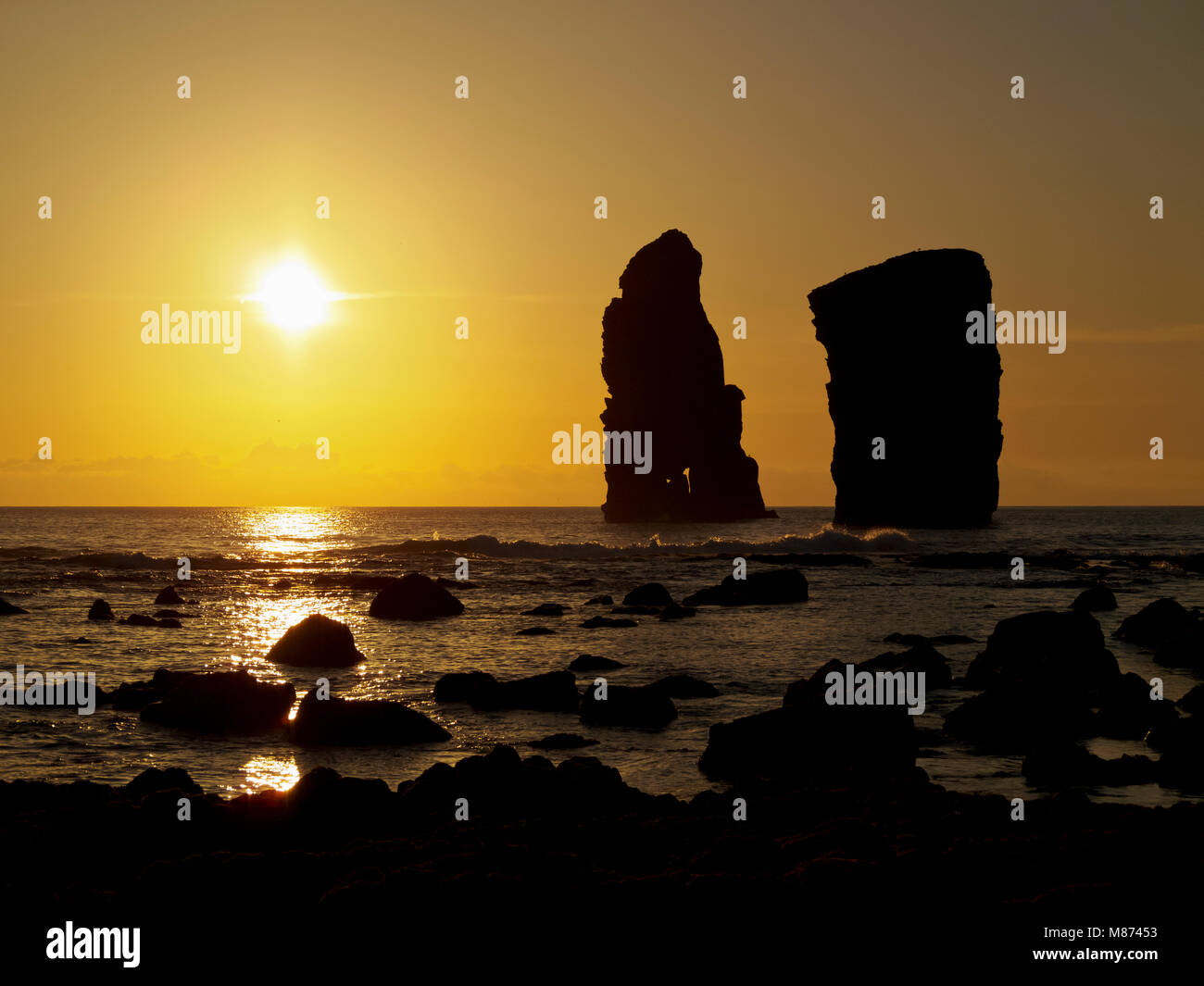 Sunset over the Ilheus dos Mosteiros, Sao Miguel Island, Azores ...