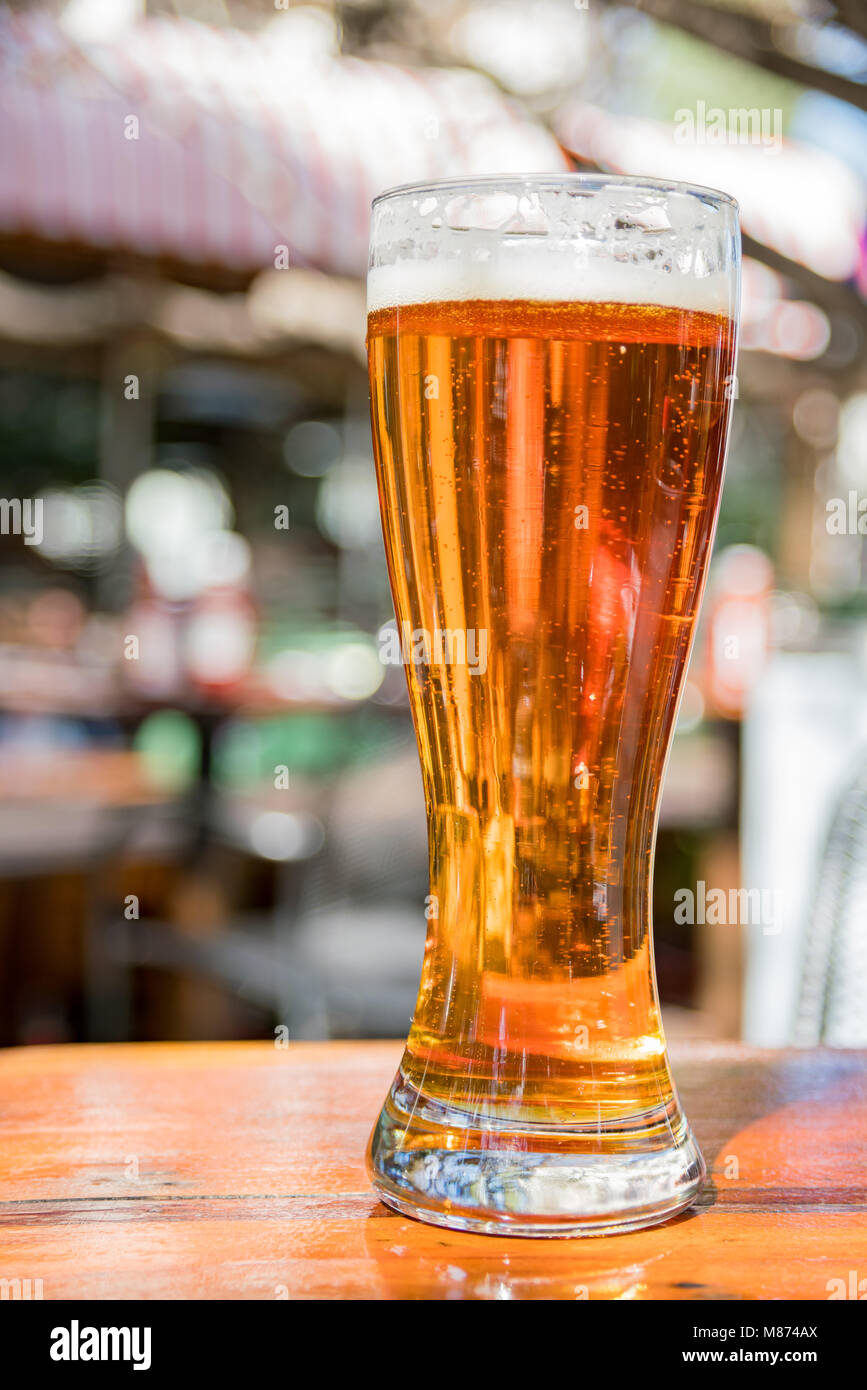 Close up shot of glass of cold beer under sunshine at Sacramento ...
